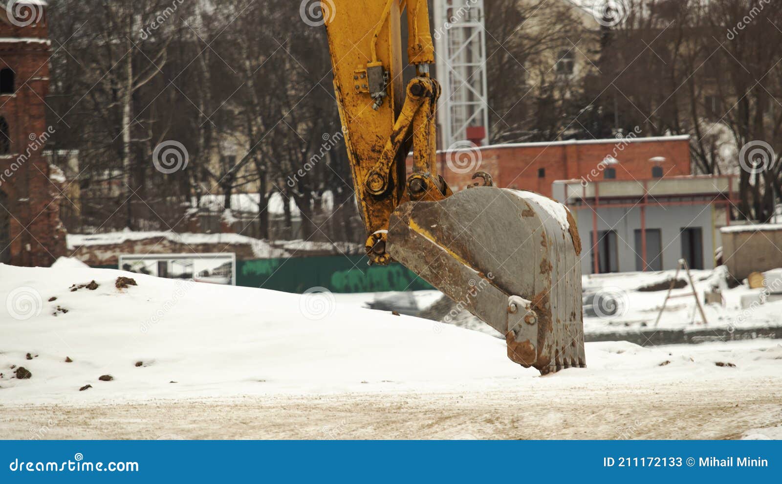 Yellow Excavator Bucket Stuck in the Snow Stock Image - Image of ...