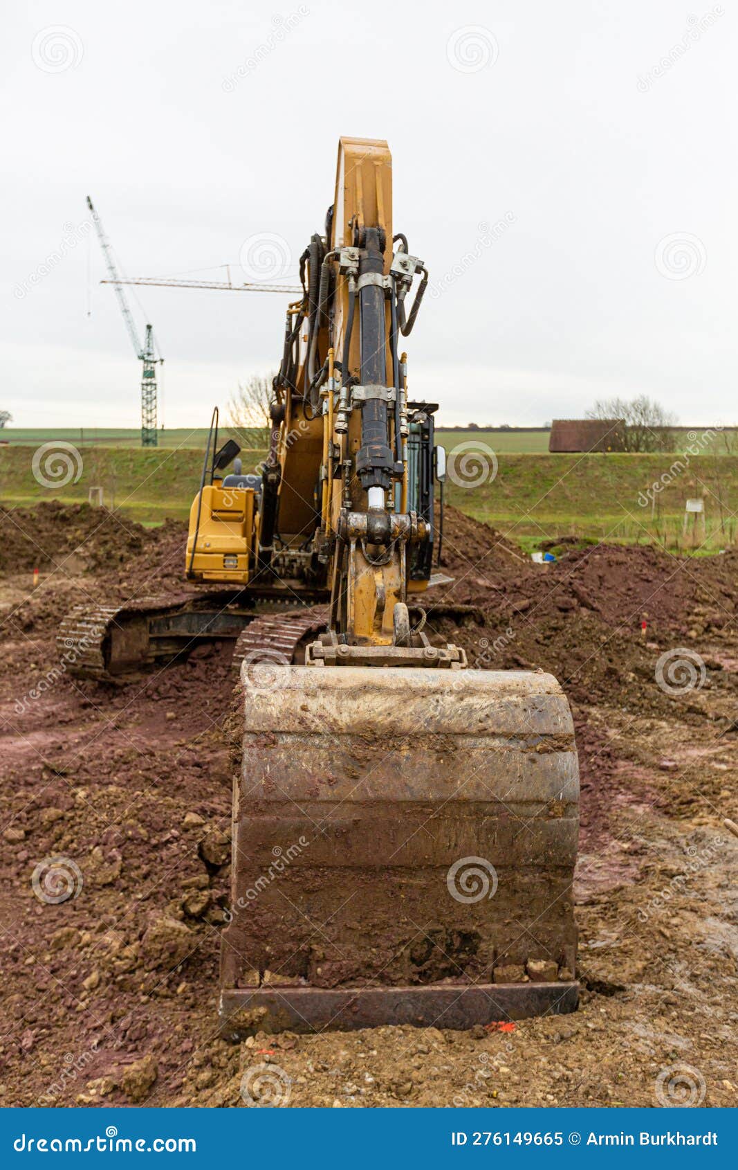 Yellow Excavator on a Construction Site Stock Image - Image of wheel ...