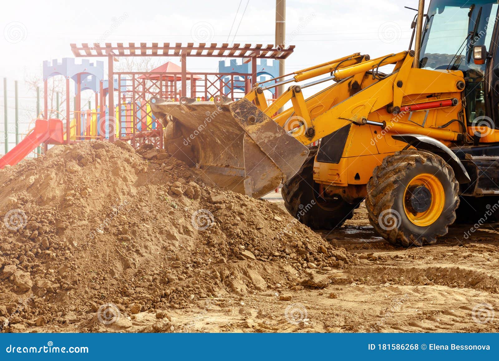Yellow Excavator. Digger Machine Removing Earth in Construction Site ...