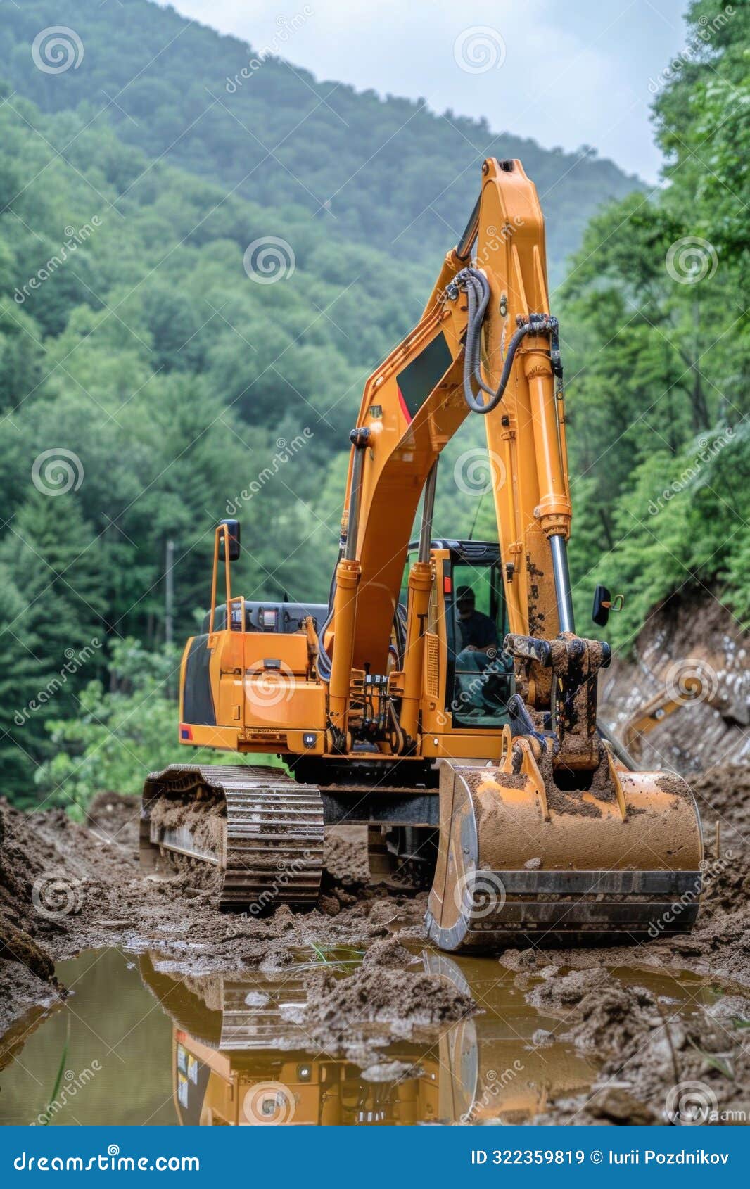 A Yellow Excavator is Digging a Hole in the Mud in a Forest, Working on ...