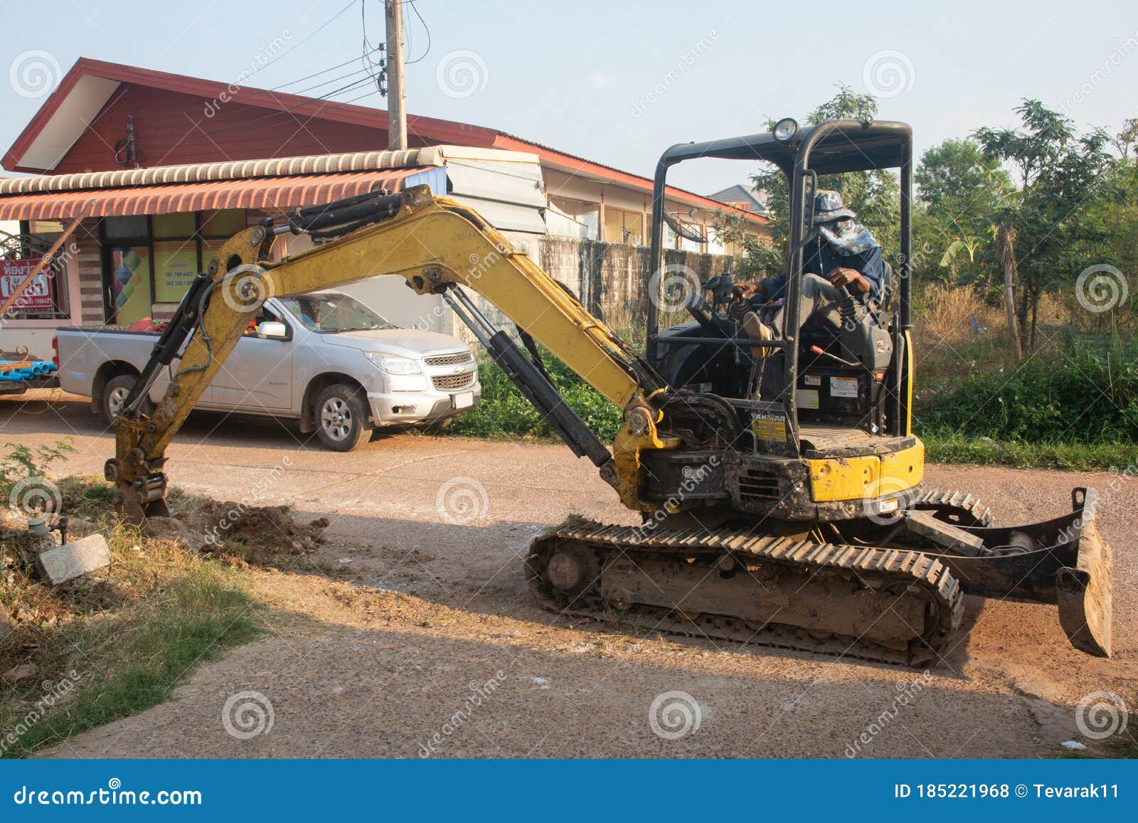 Yellow Excavator Machine Working Earth Moving Works at Construction ...