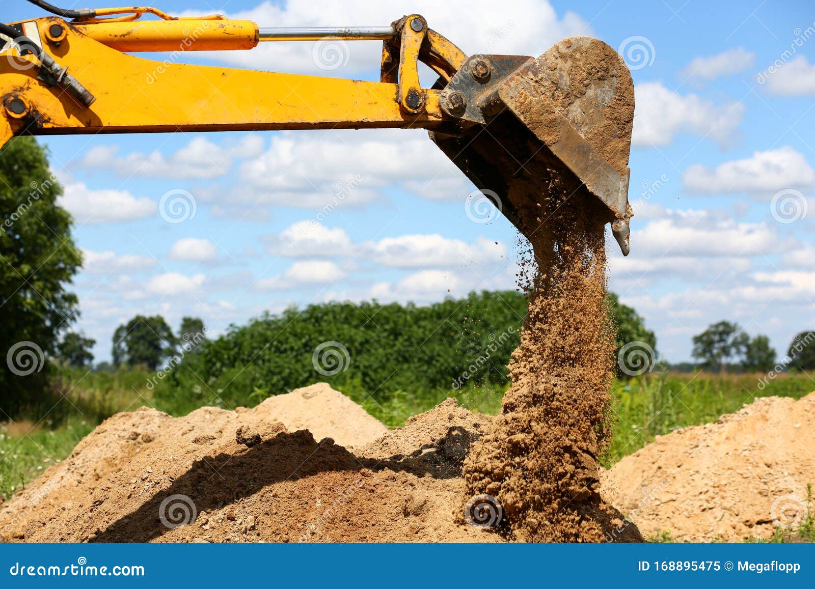 Yellow Excavator Shovel Digging Pit in Ground Stock Image - Image of ...
