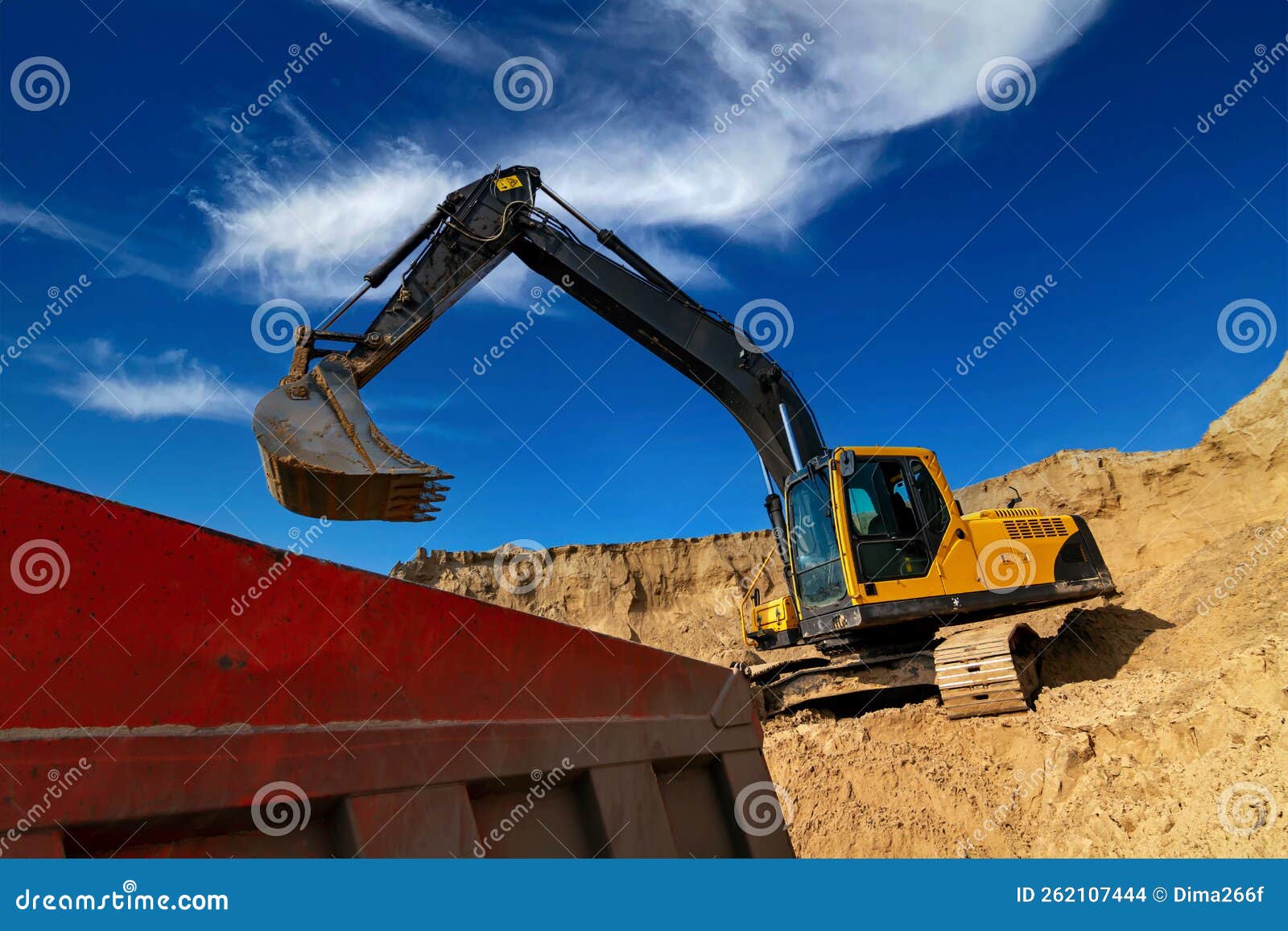 Yellow Excavator Working with Sand at Construction Site Stock Photo ...