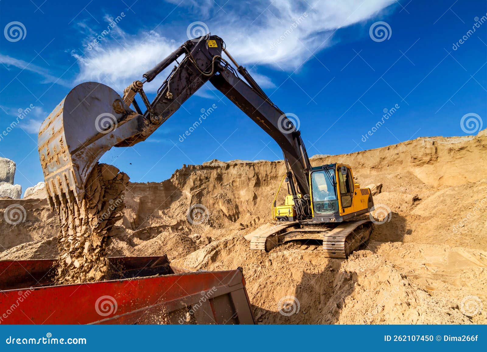 Yellow Excavator Working with Sand at Construction Site Stock Photo ...
