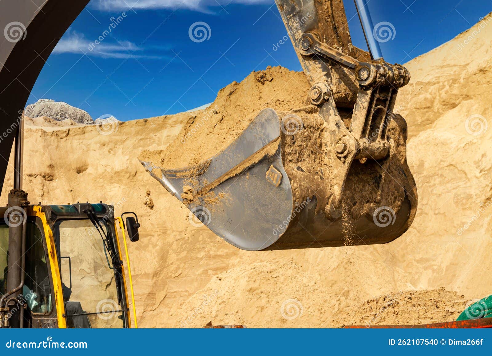 Yellow Excavator Working with Sand at Construction Site Stock Photo ...