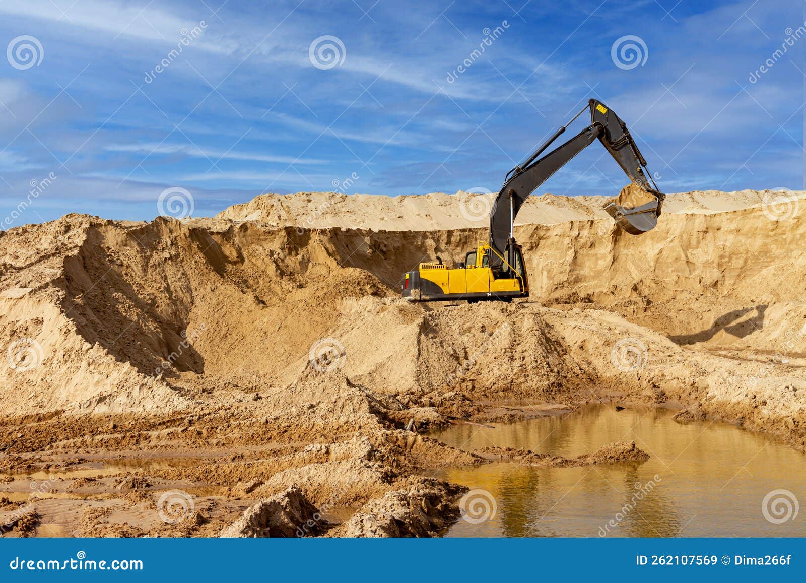 Yellow Excavator Working with Sand at Construction Site Stock Image ...