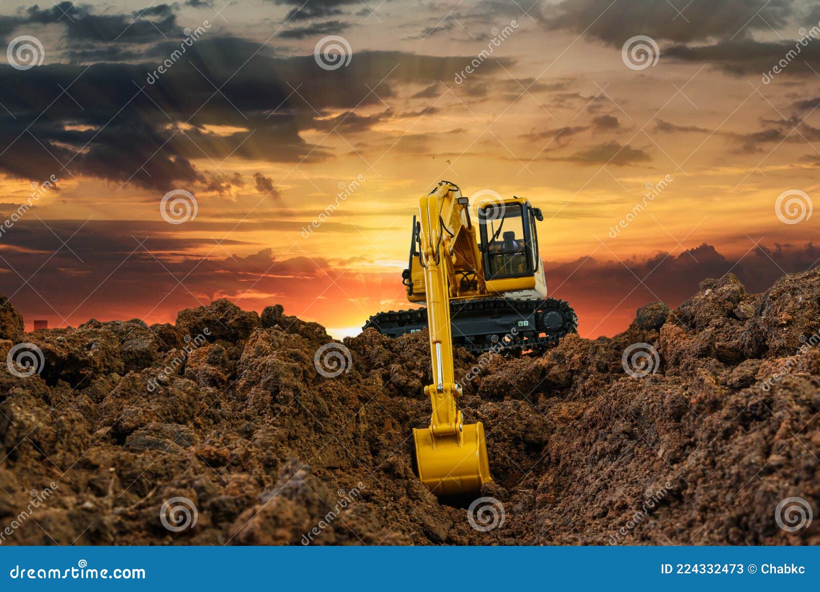 Yellow Excavators Are Digging The Soil In The Construction Site ...