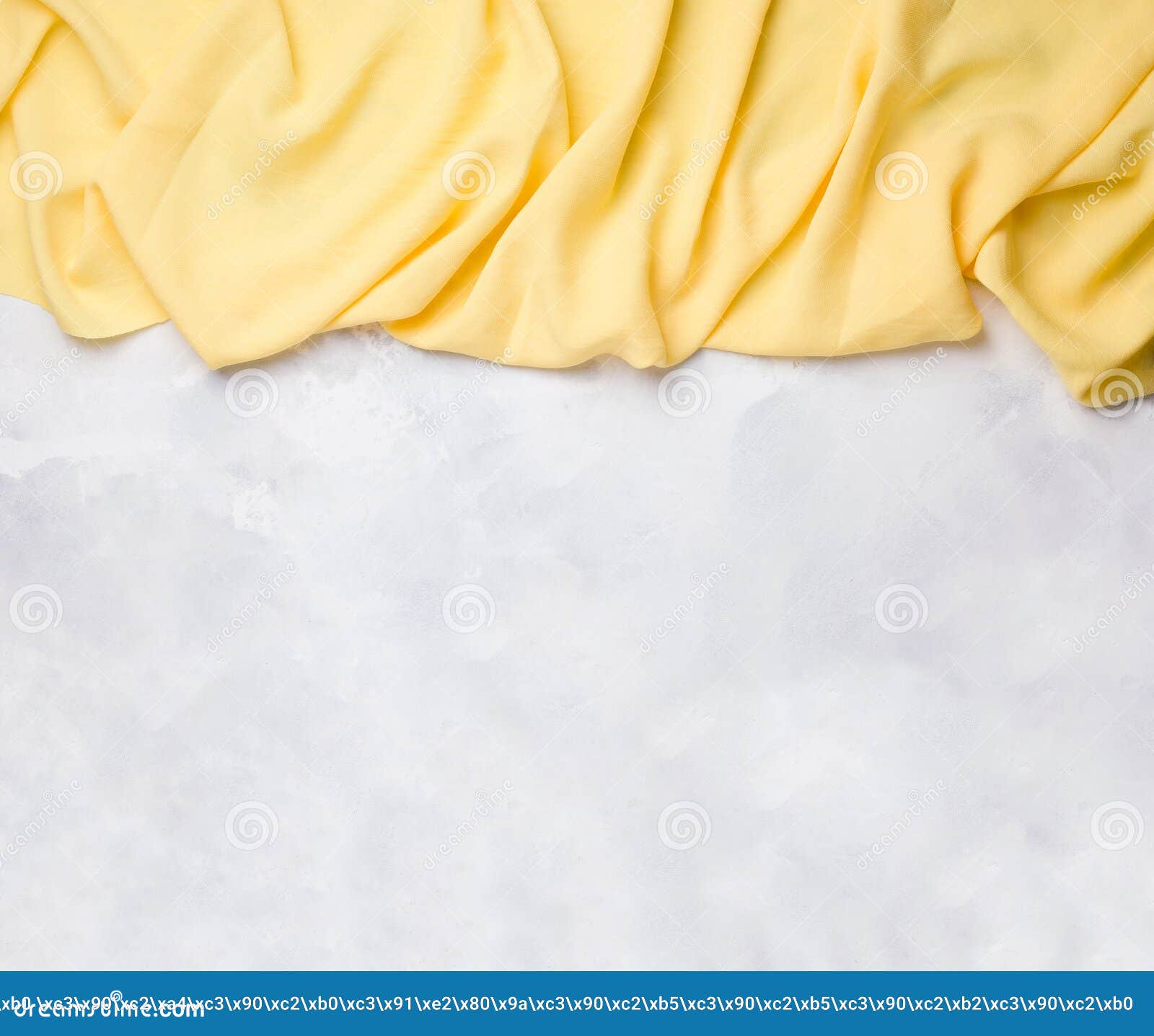 Yellow Fabric Falling Down from Above on a Concrete. Copy Space Stock ...