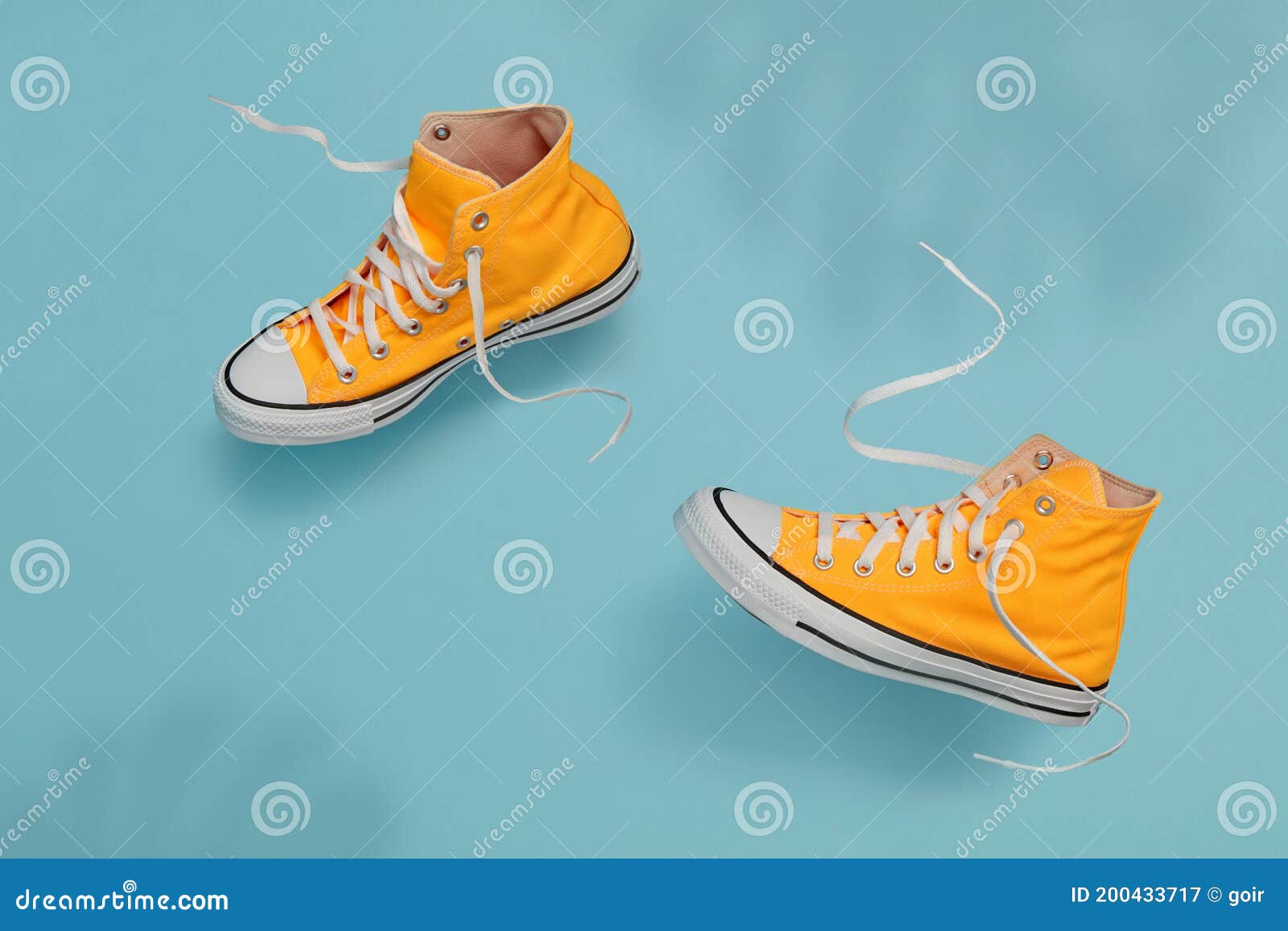 Yellow falling shoes stock image. Image of landscape - 200433717
