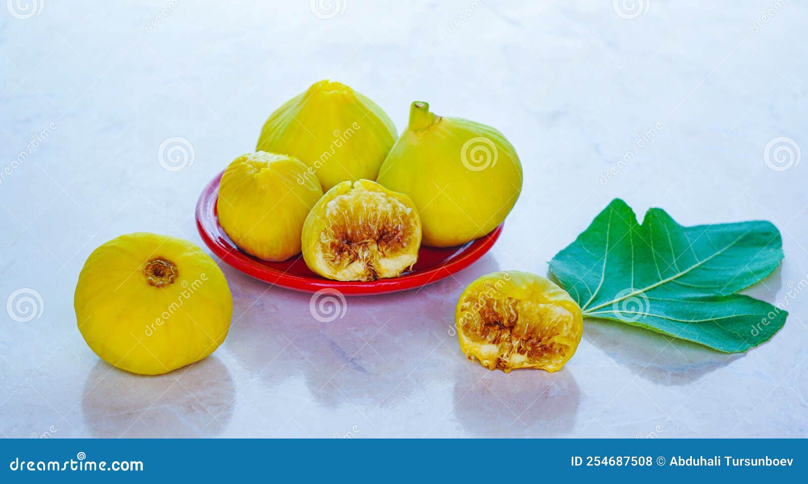Yellow figs stock photo. Image of studio, healthy, eating - 254687508