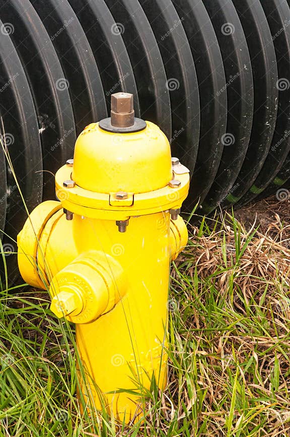 Yellow Fire Hydrant, at a Housing Construction Site Stock Photo - Image ...