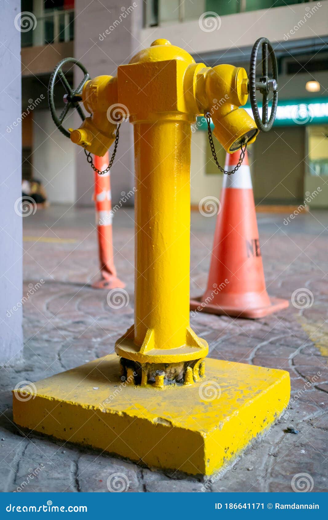 Yellow Fire Hydrant and Safety Cone Stock Image - Image of city ...