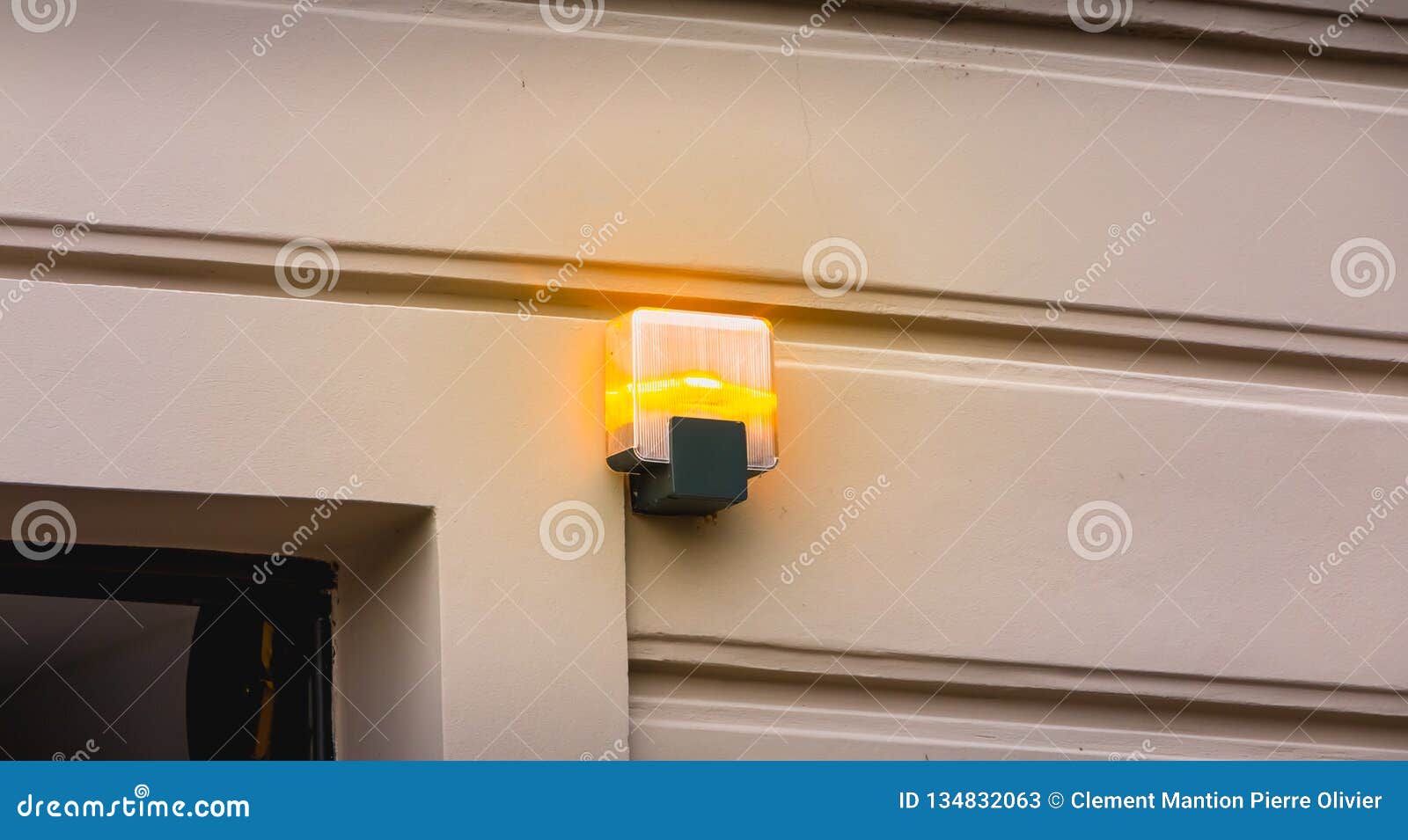 Yellow Flashing Light at the Exit of a Parking Lot Stock Image - Image ...