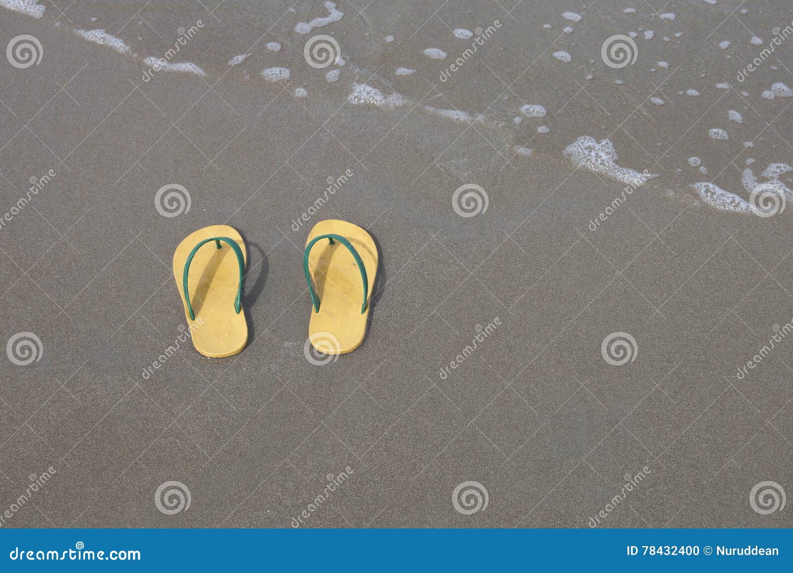 Yellow Flip-flops Footware Pair on the Beach Sand Stock Photo - Image ...