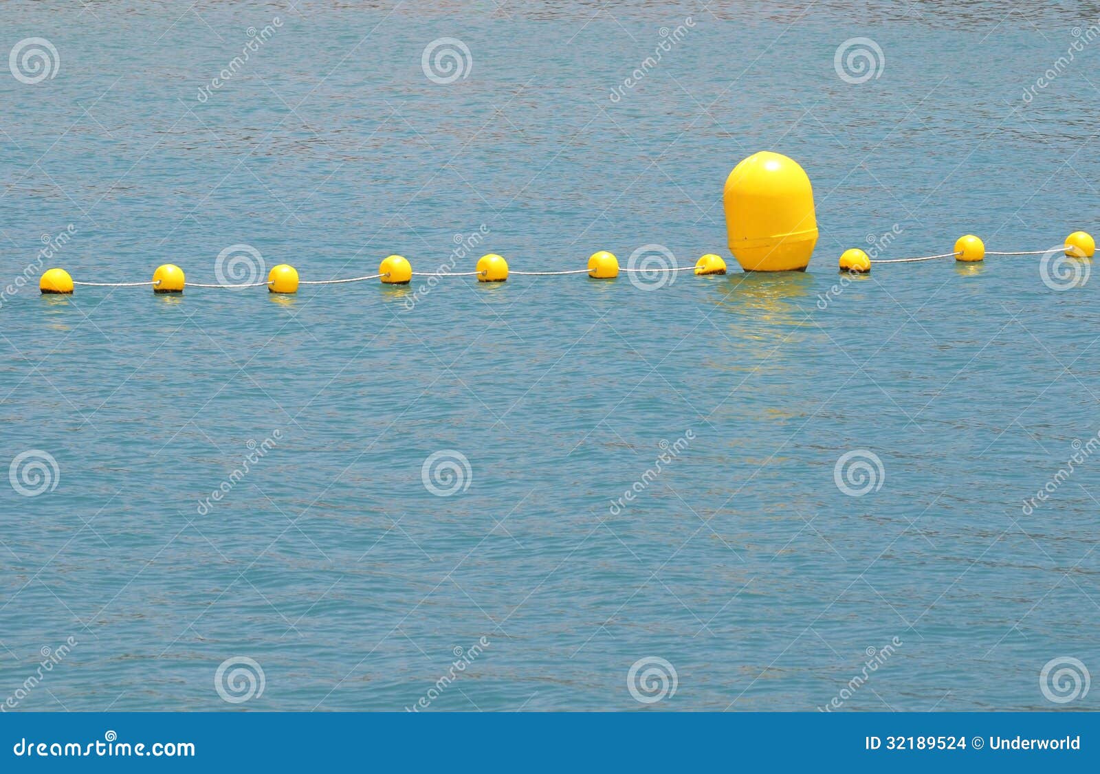 Yellow Floaters stock photo. Image of unlit, boat, bray - 32189524