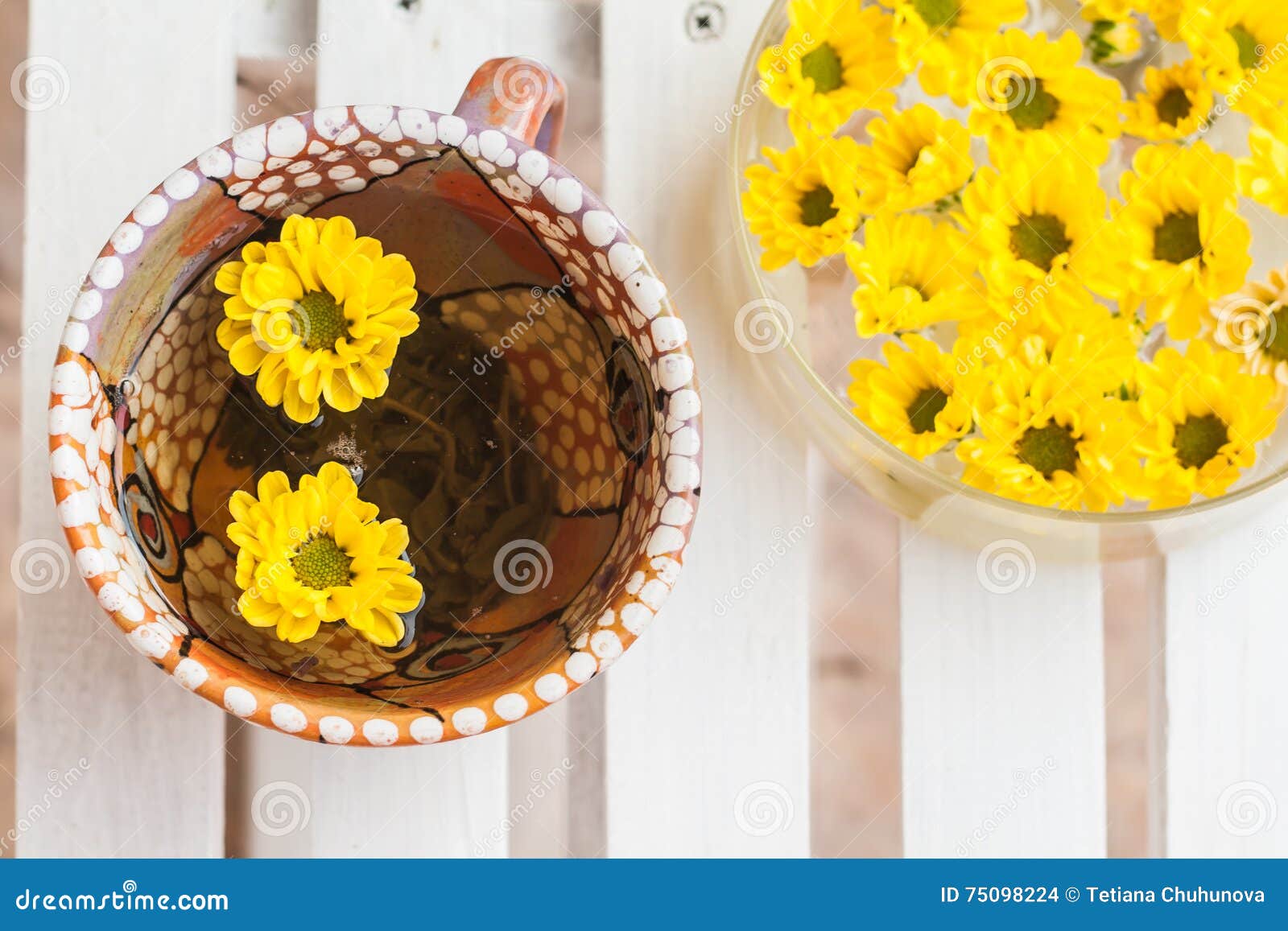 Yellow Flowers in a Cup of Tea Stock Photo - Image of color, heat: 75098224