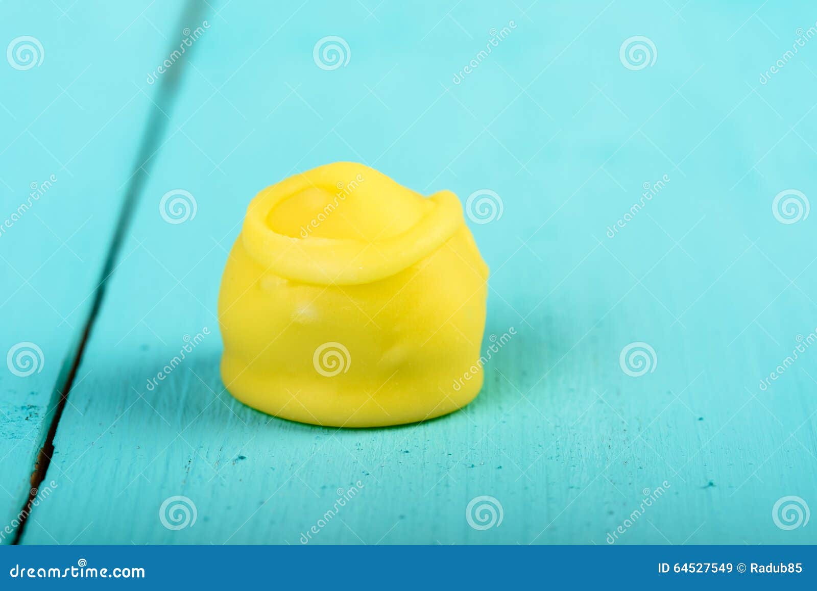 Yellow Fondant Candy on Turquoise Stock Image - Image of festive ...