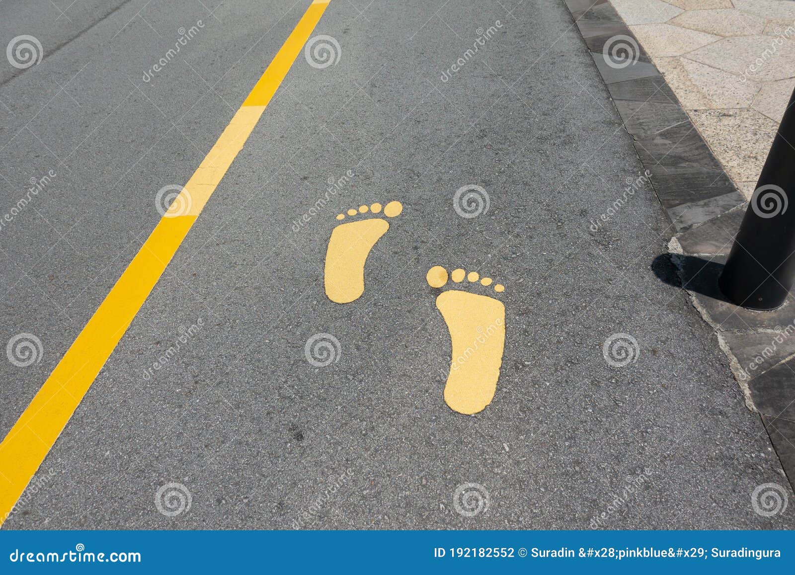 Yellow Foot Symbol for Walk Path on Road Stock Photo - Image of human ...