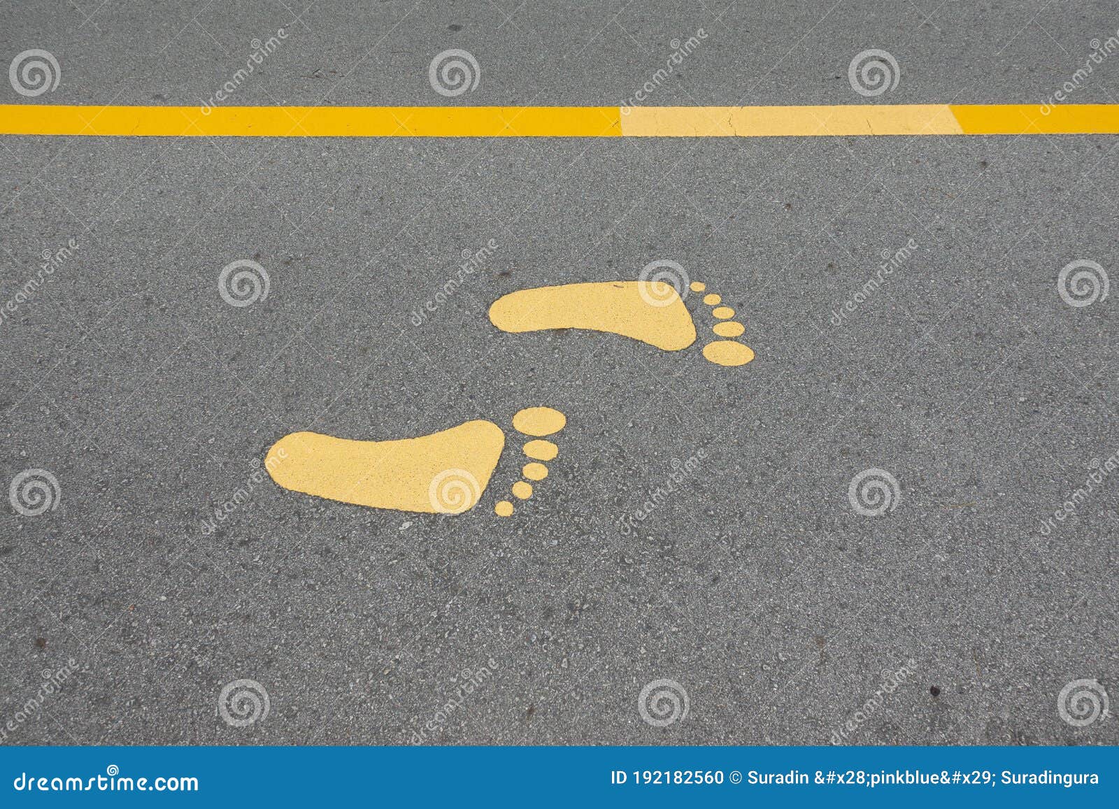 Yellow Foot Symbol for Walk Path on Road Stock Photo - Image of ground ...