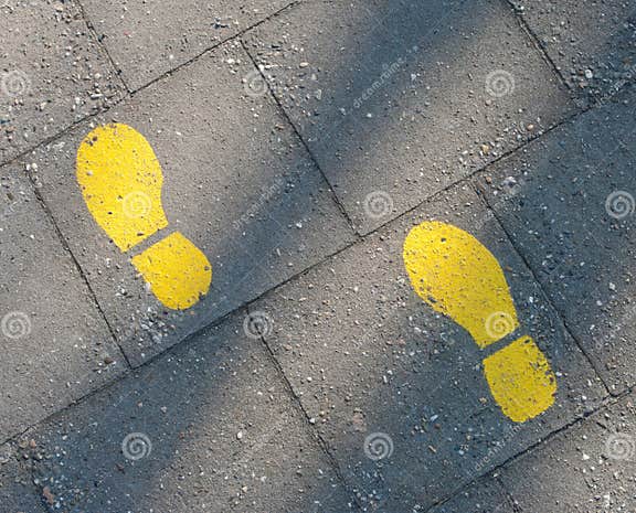 Yellow footsteps stock image. Image of footprint, street - 19353849