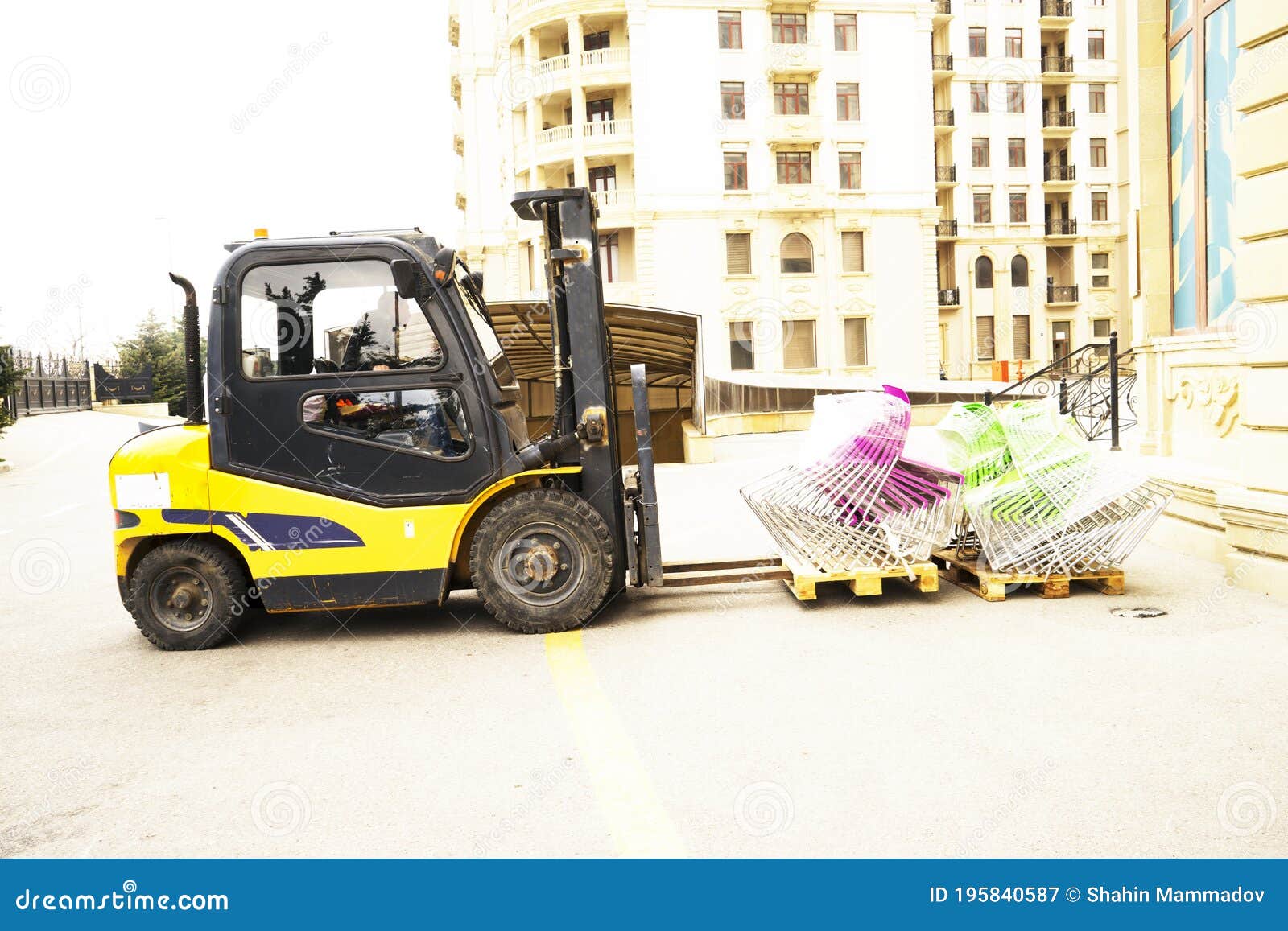 Yellow Forklift Stands on a Construction Site Stock Image - Image of ...