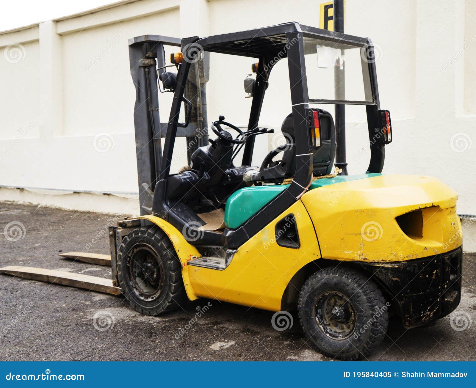 Yellow Forklift Stands on a Construction Site Stock Image - Image of ...