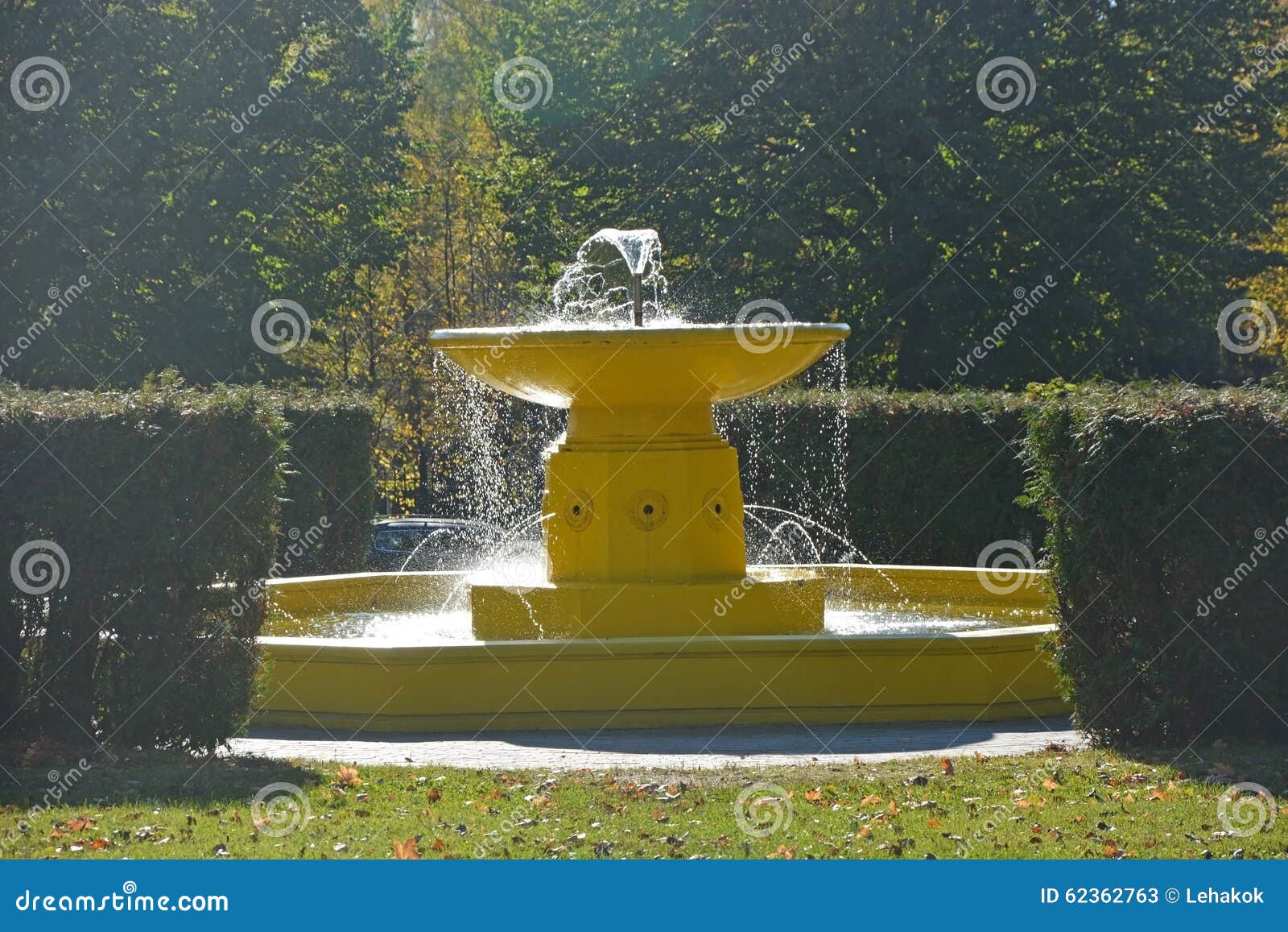 Yellow fountain stock image. Image of emanate, drops - 62362763