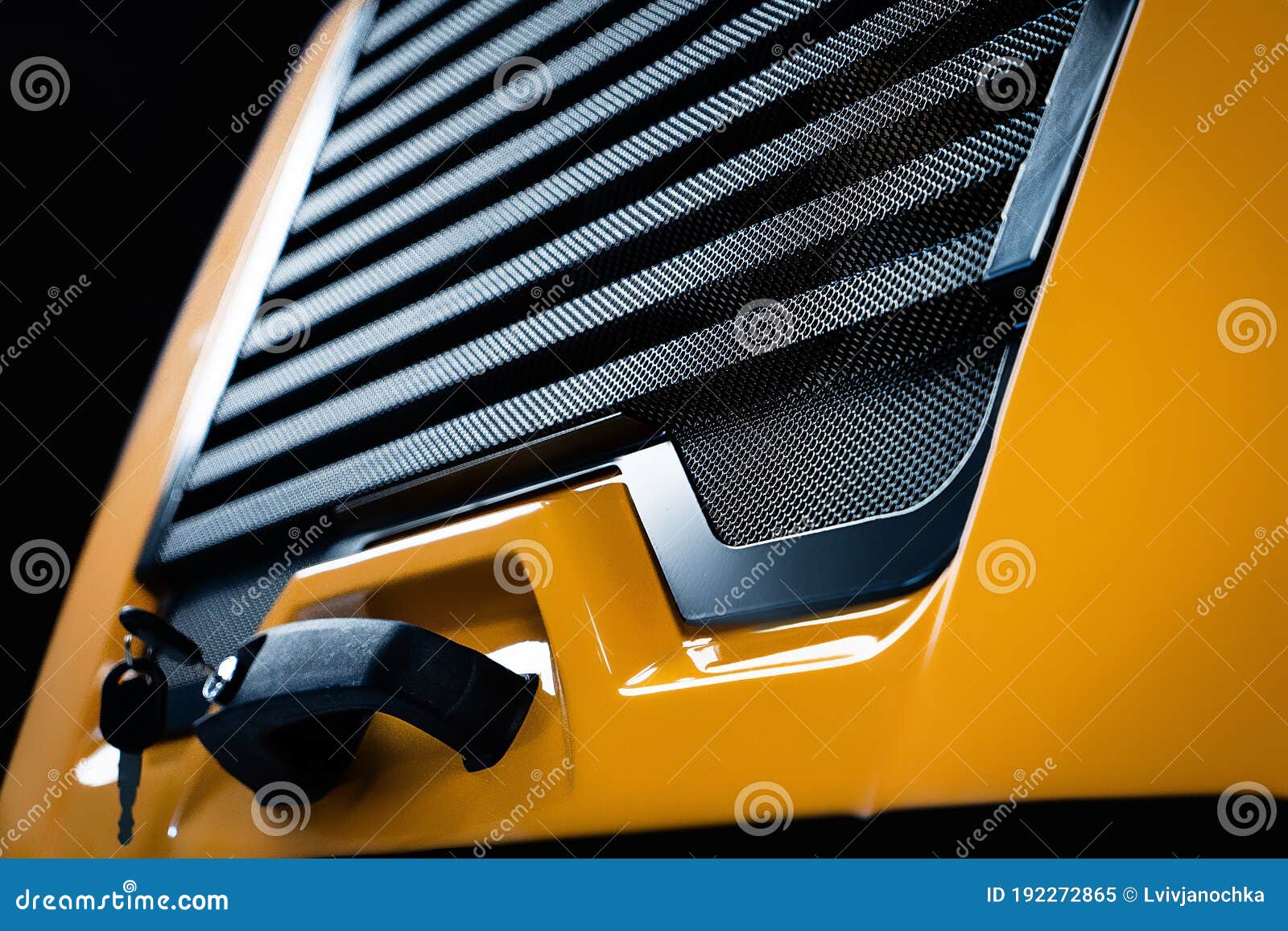Yellow Front Panel of a Car Tractor. Industry Technologies, Metal Mesh ...
