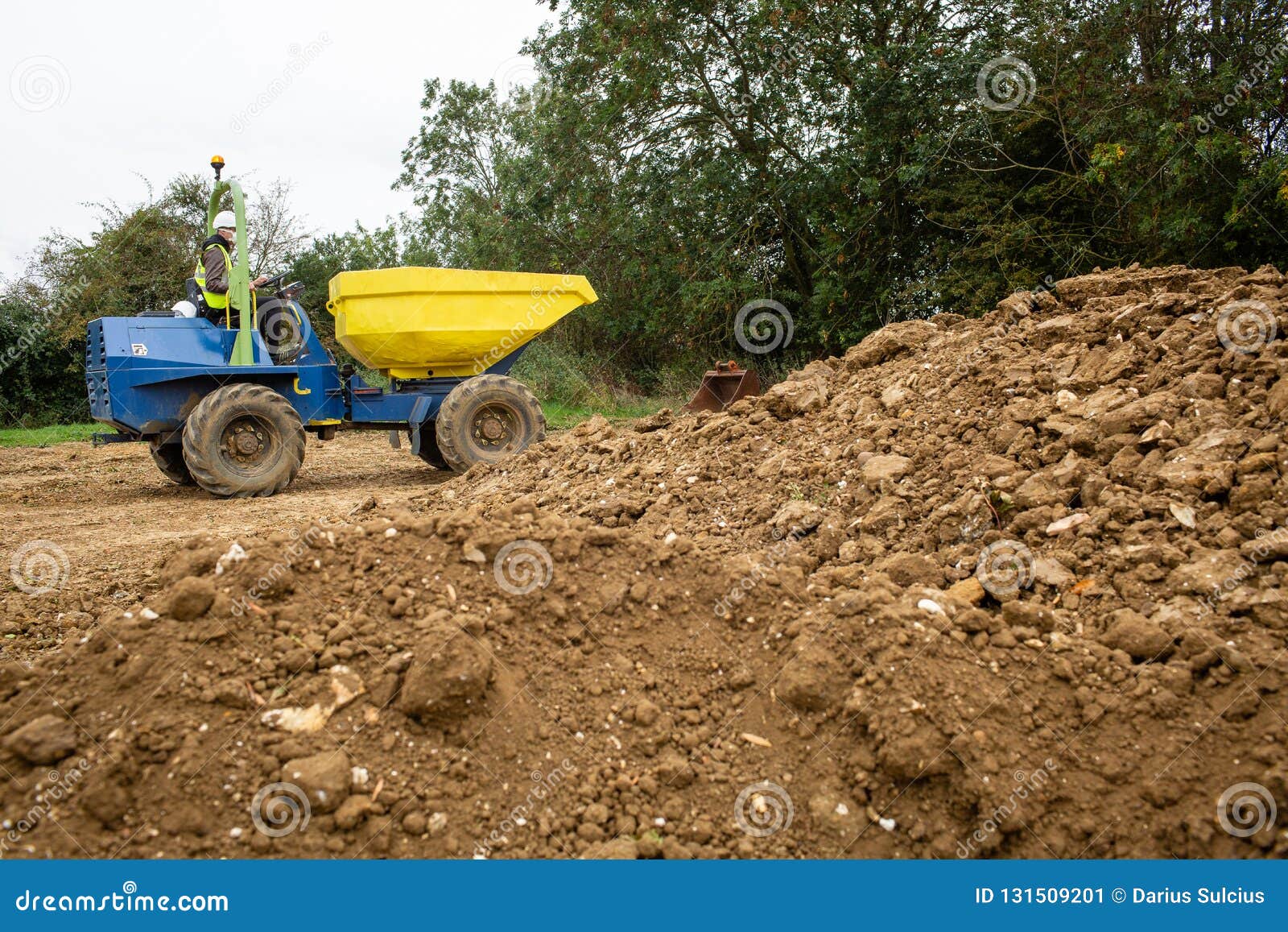 Yellow Front Tipper Dumper Working in Construction Site. Stock Image ...