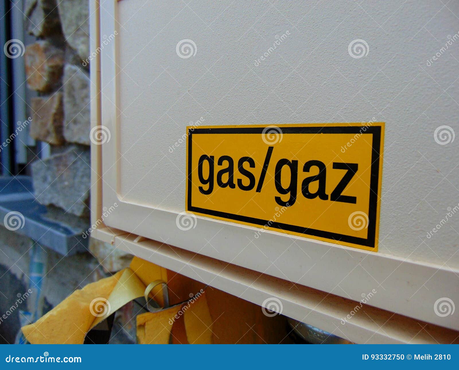 Yellow Gas Sign on White Box of House Stock Photo - Image of simple ...