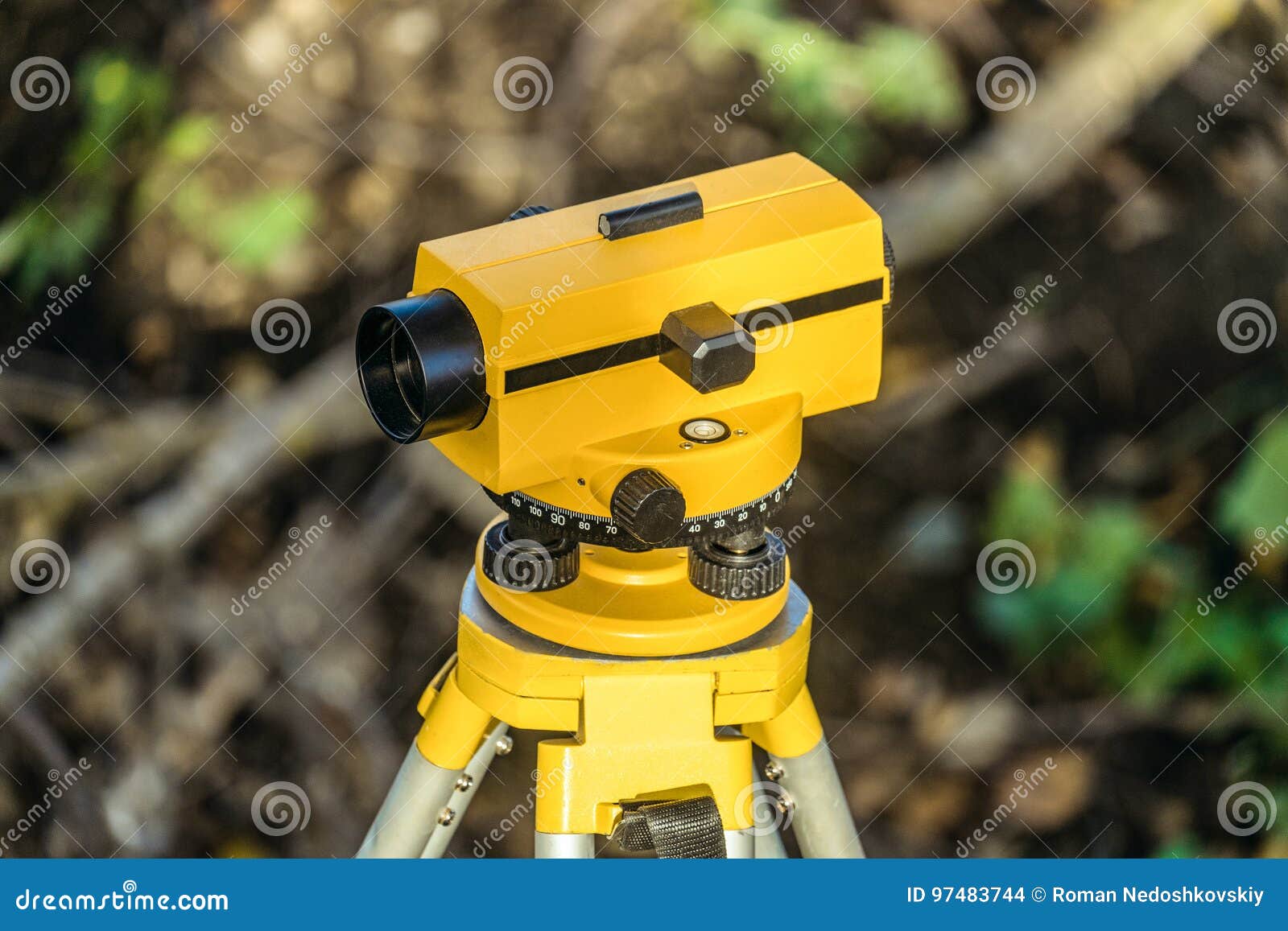 Yellow Geodetic Optical Level on a Tripod Stock Photo - Image of ...