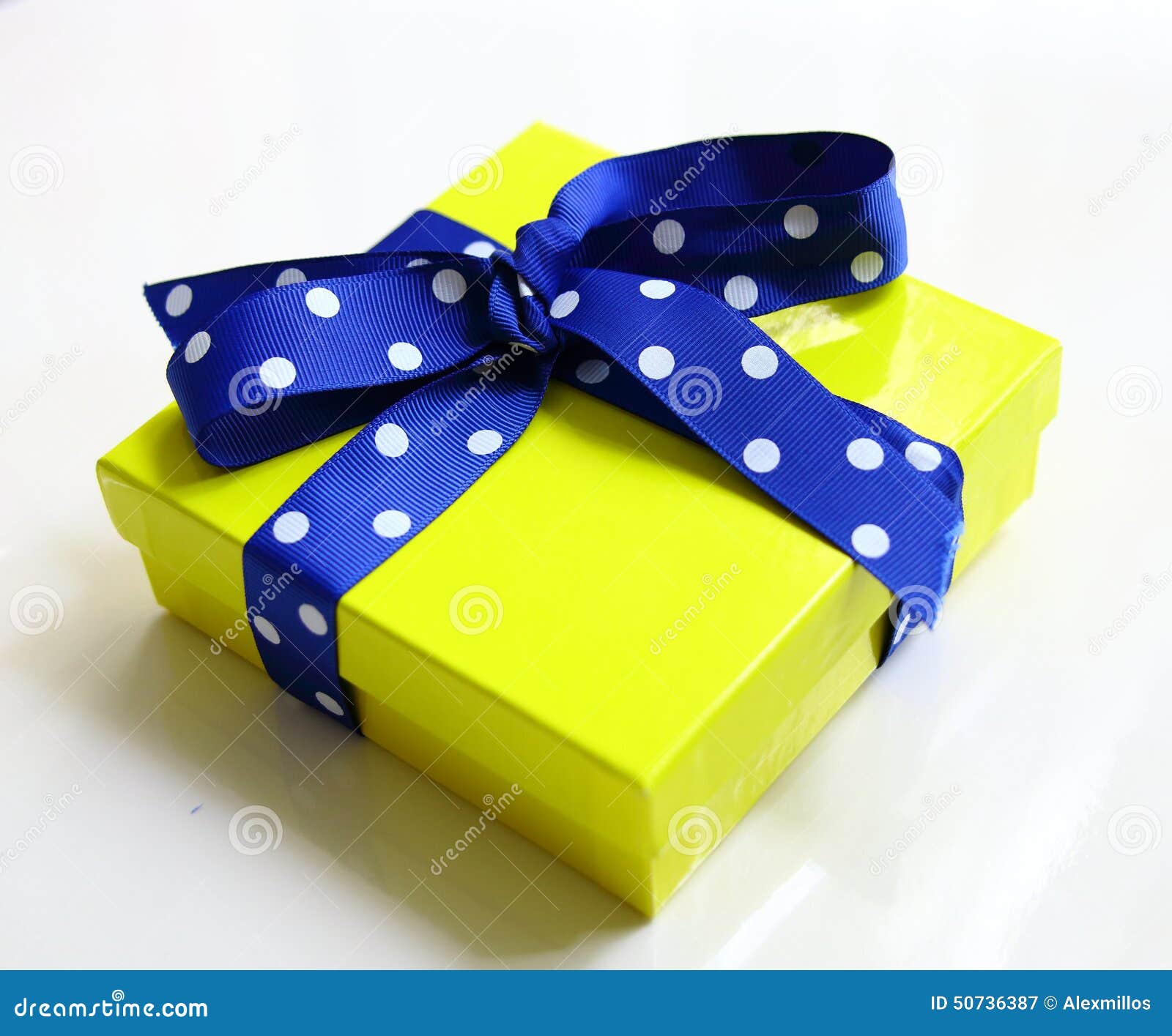 Yellow Gift Box and Blue Dotted Ribbon Isolated Stock Image - Image of ...