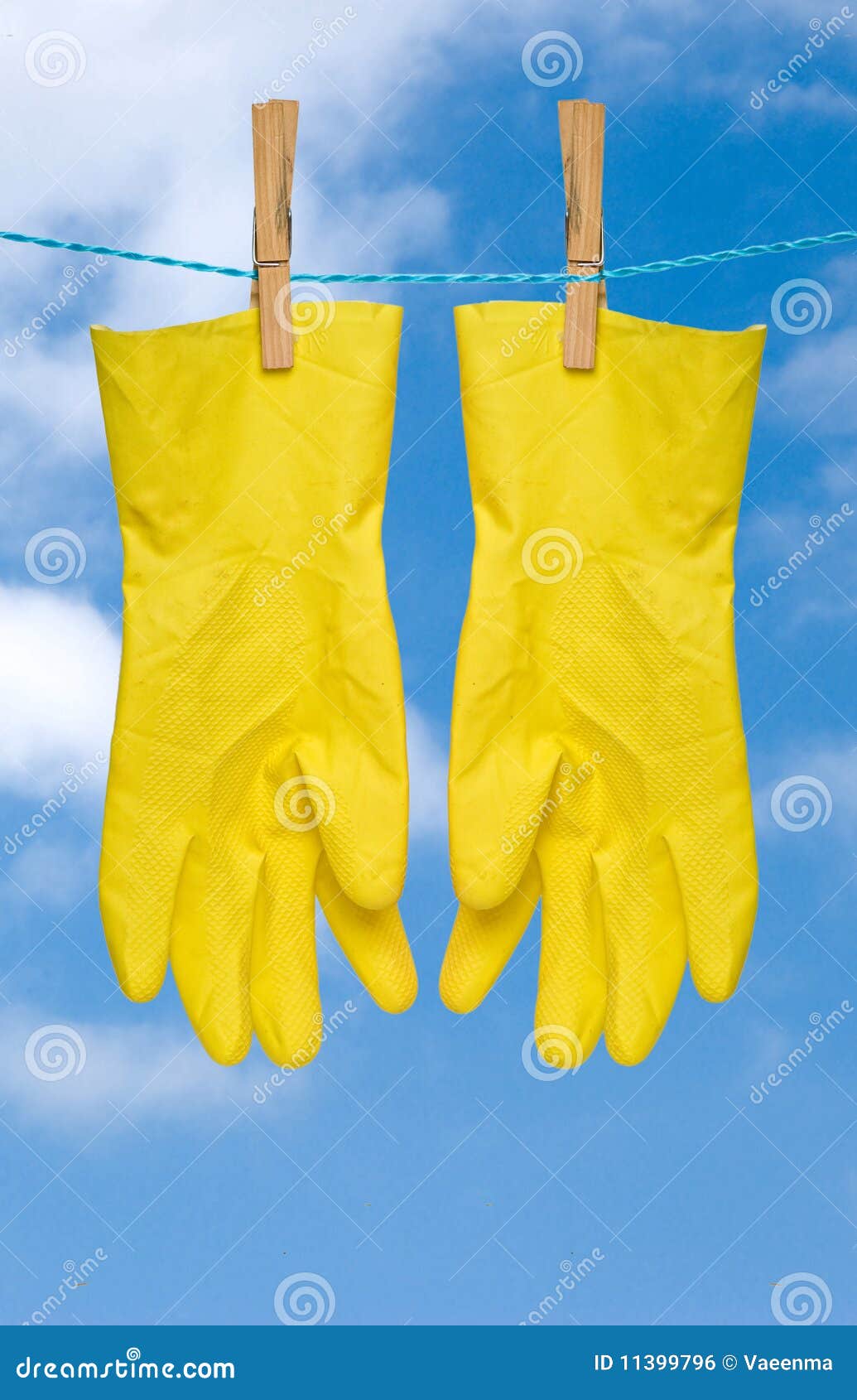 Yellow Gloves Drying on Rope Stock Photo - Image of cloudy, glove: 11399796