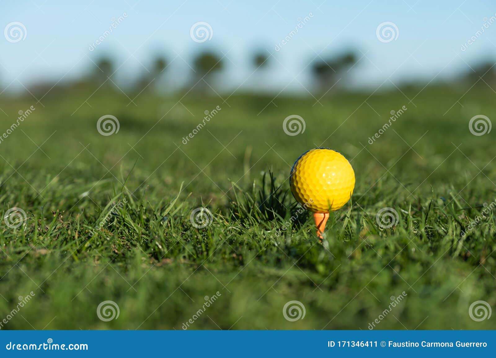 Yellow Golf Ball on the Ground at the Driving Range Stock Image - Image ...
