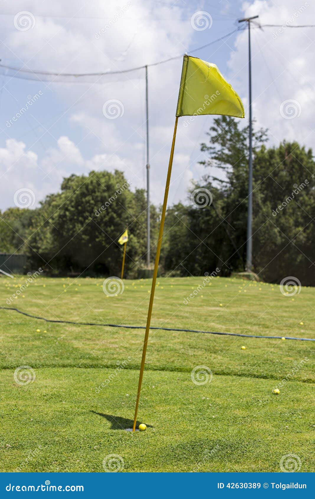 Yellow Golf Flag on the Beautiful Golf Course Stock Image - Image of ...