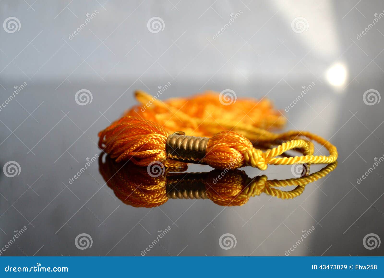 Yellow Graduation Tassel stock image. Image of black - 43473029