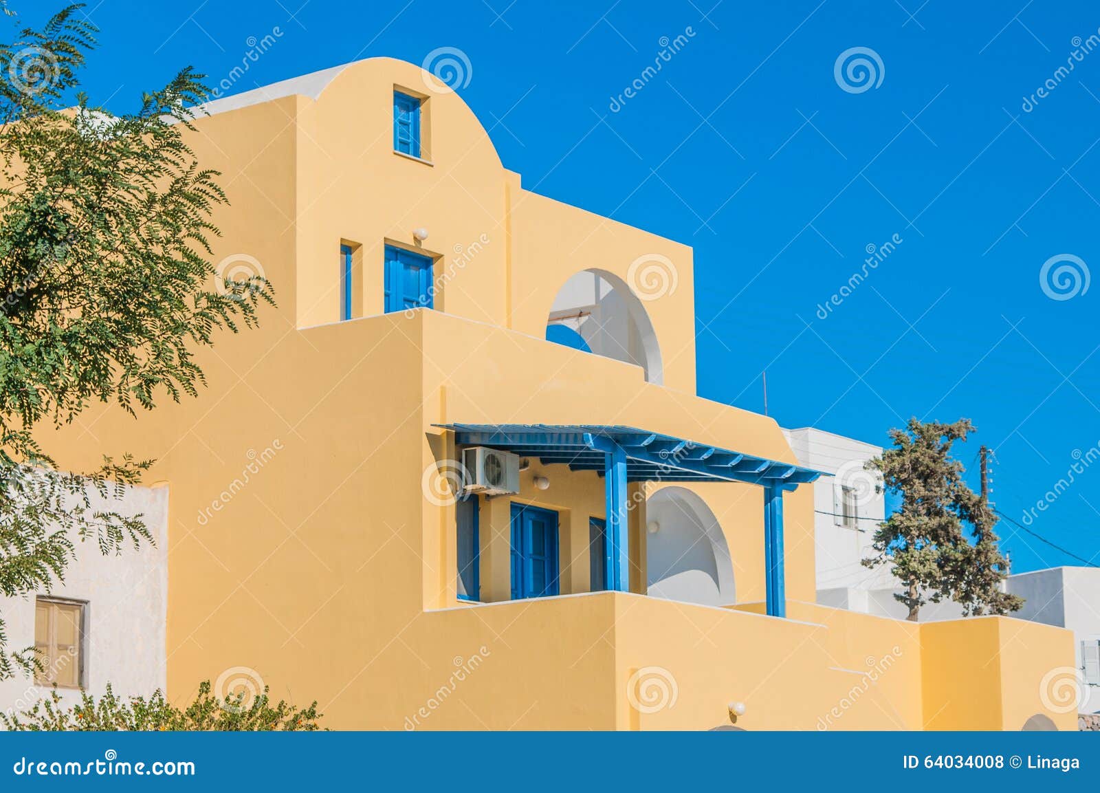 Yellow greek house stock photo. Image of tourism, house - 64034008