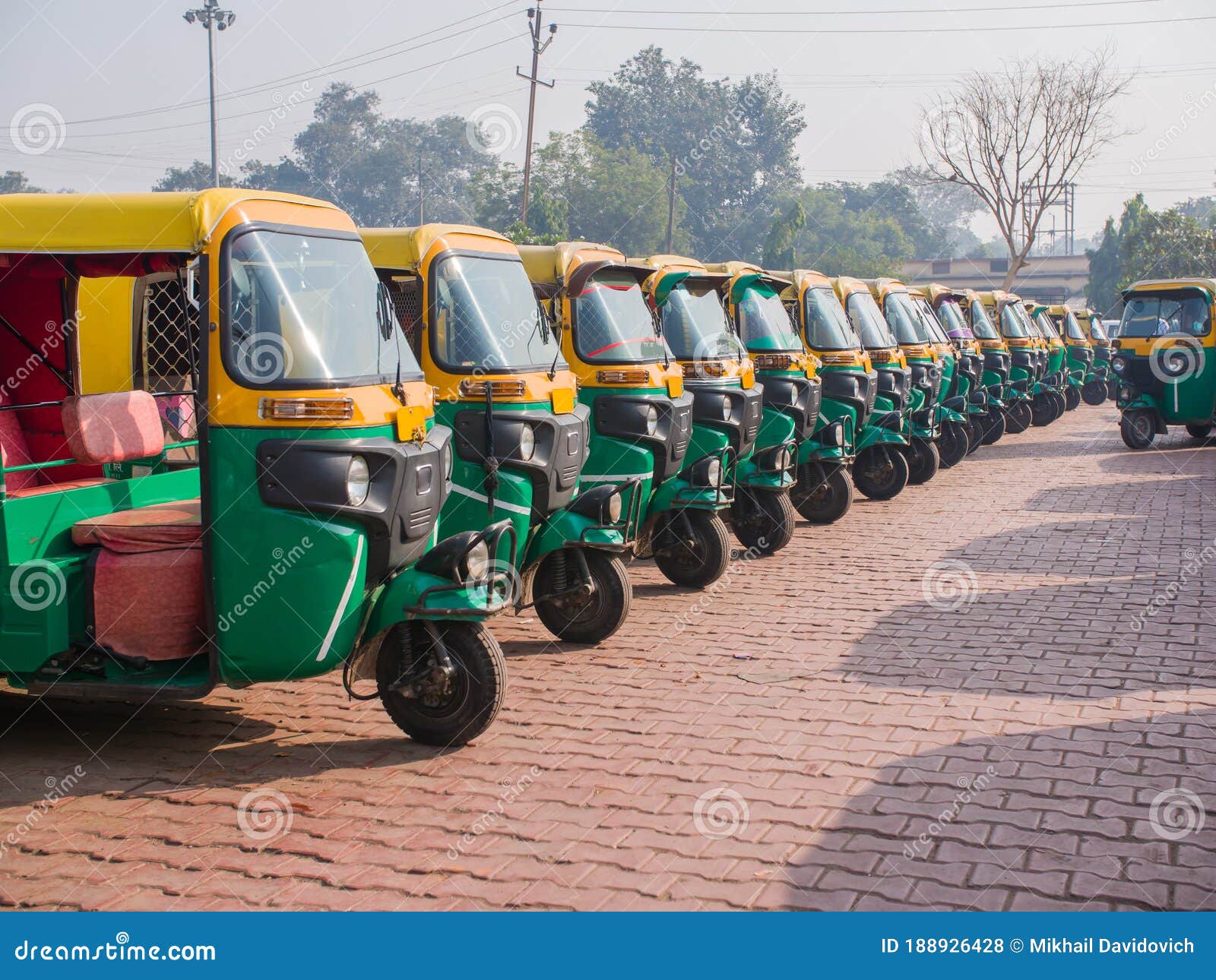 Yellow and Green Auto Rickshaws in Indiya. Stock Photo - Image of ...