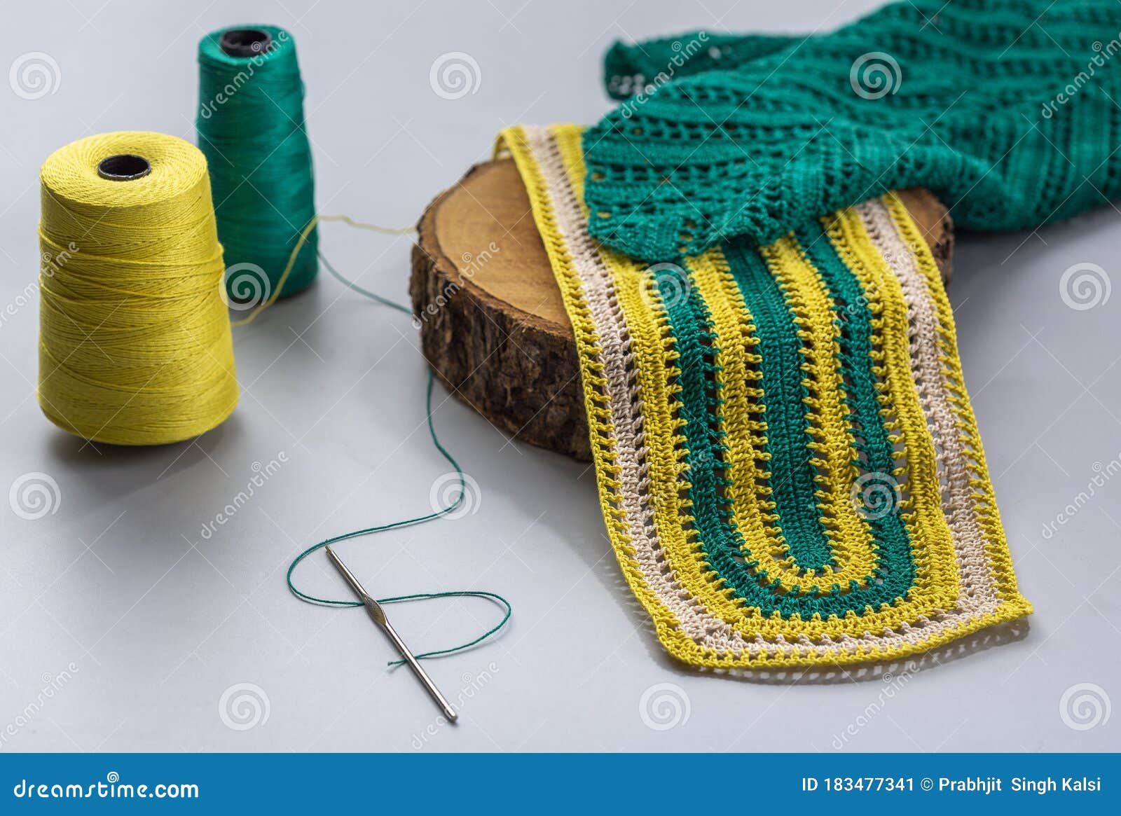 Yellow and Green Crocheting Pattern with Crochet Hook Close-up Stock ...