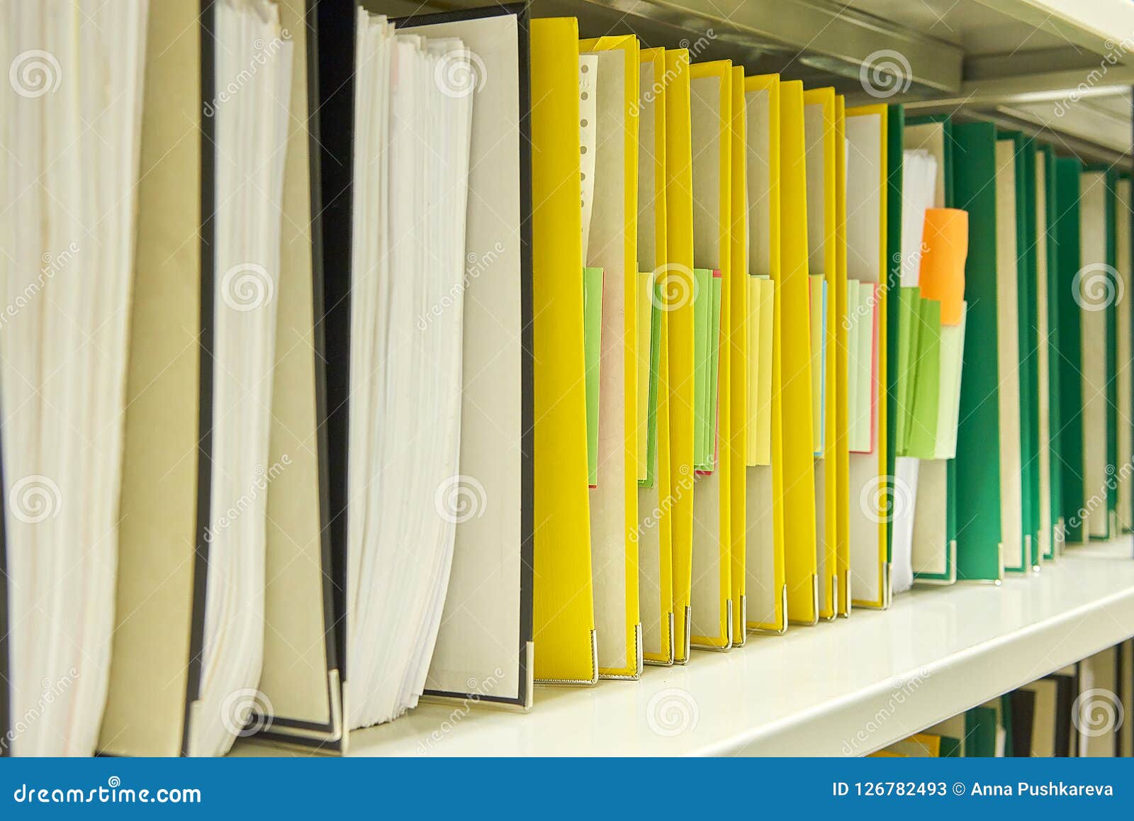 Yellow and Green File Folders in Archive. Stock Image - Image of file ...