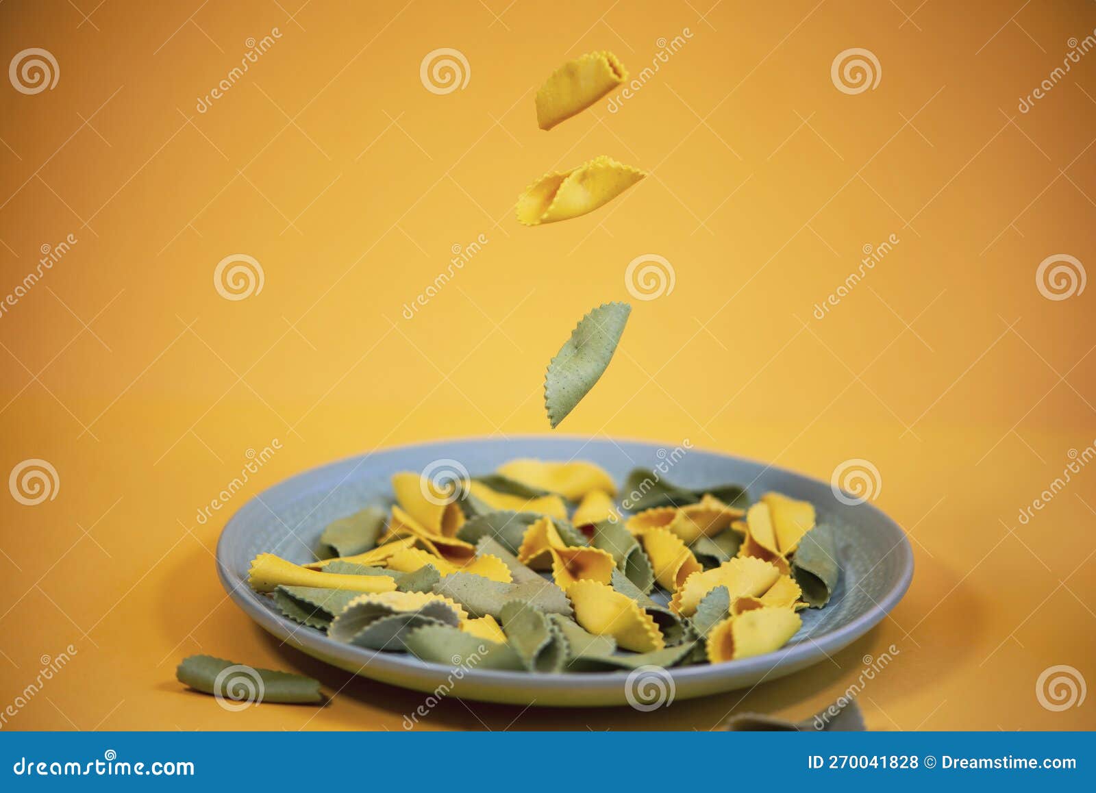 Yellow and Green Pasta with Spinach Color Stock Photo - Image of dish ...