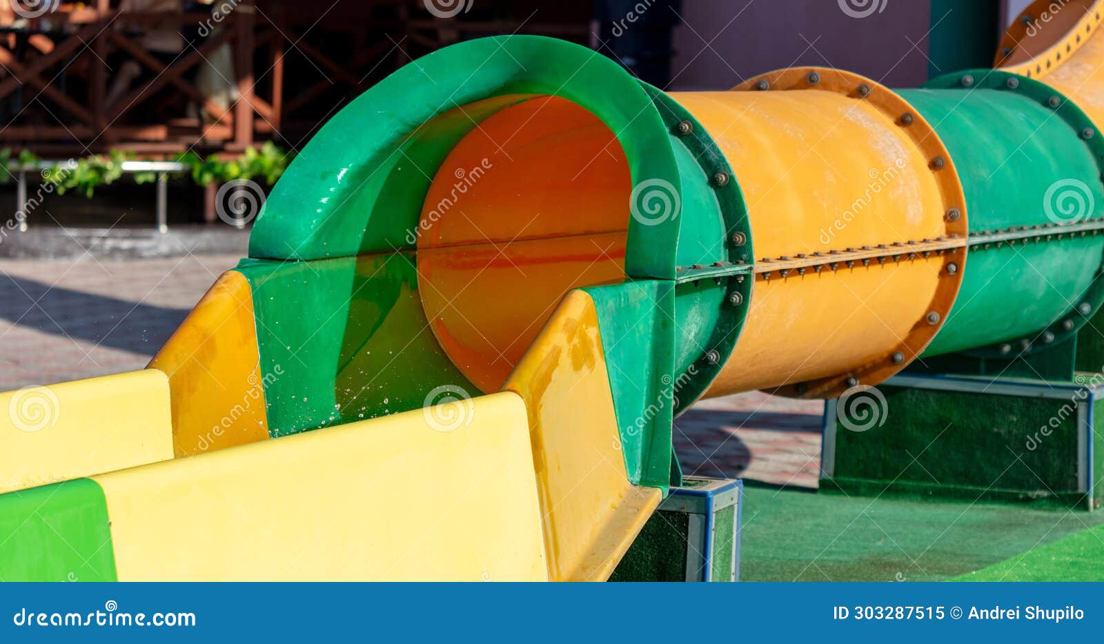 Yellow-green Slide in the Pool of the Water Park Stock Image - Image of ...