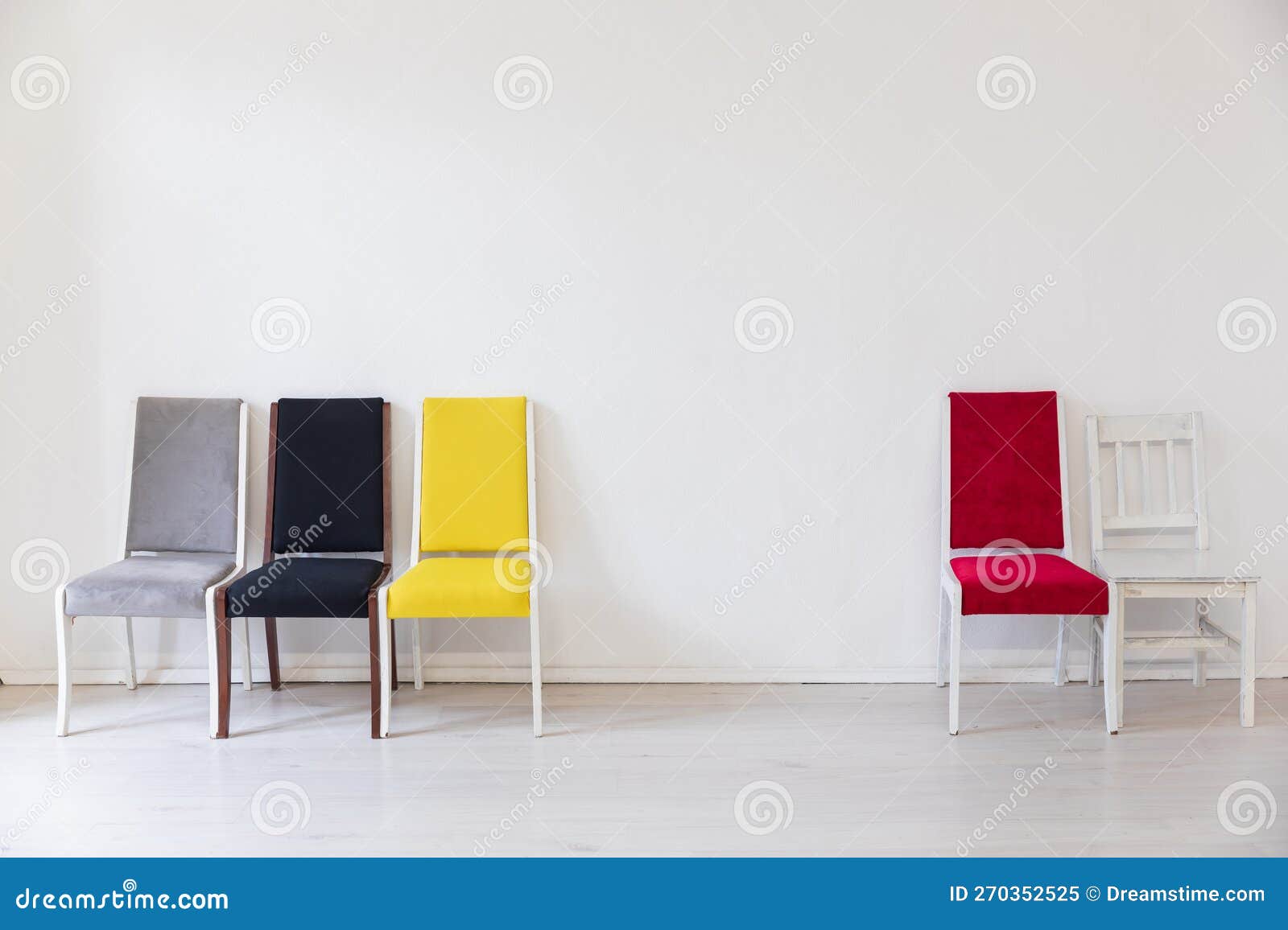 Yellow Grey Red Black Chairs in the Interior of the White Room Stock ...