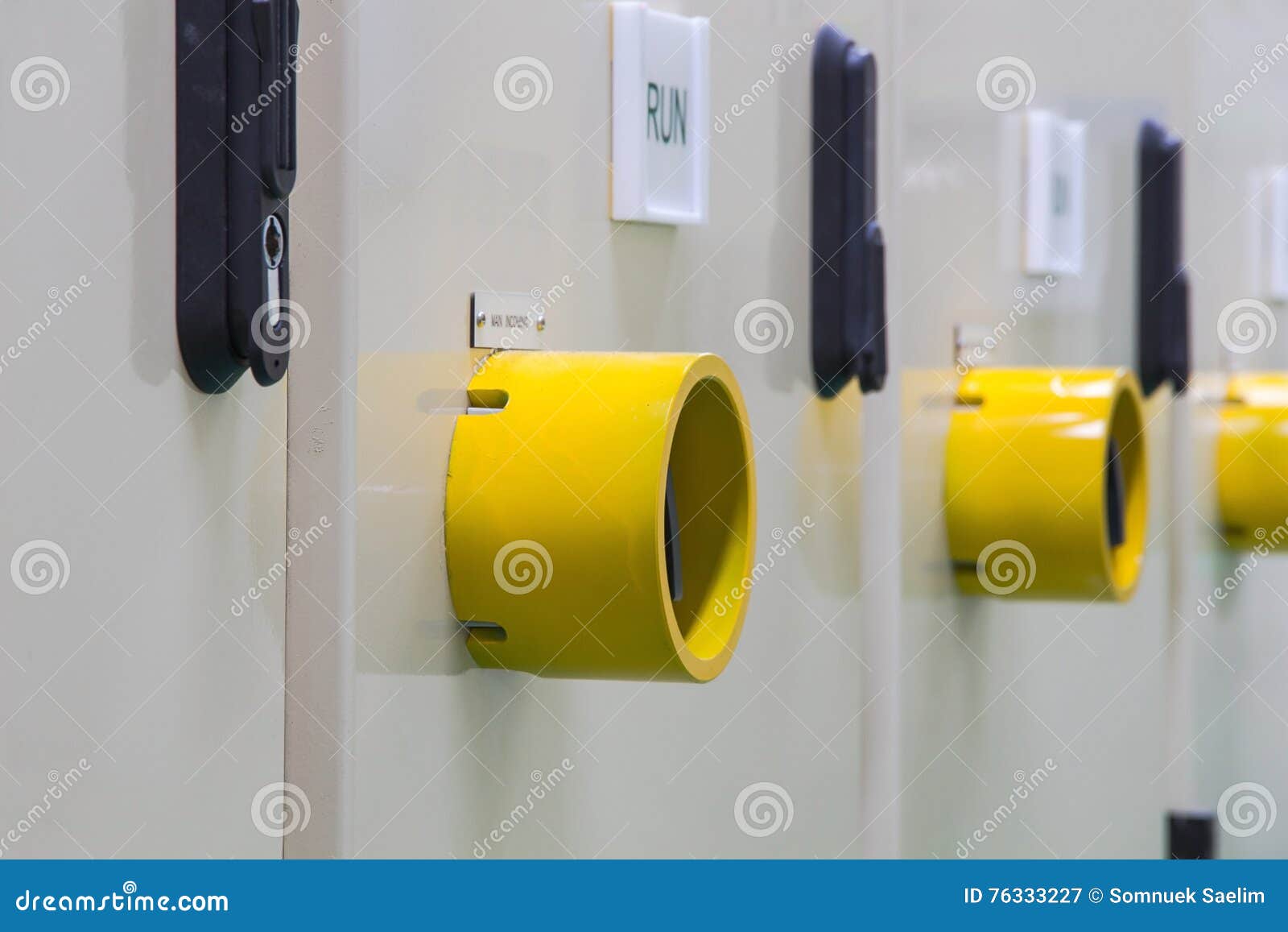 Yellow Guard of Switch Control Electrical Equipment Cabinet Stock Image ...