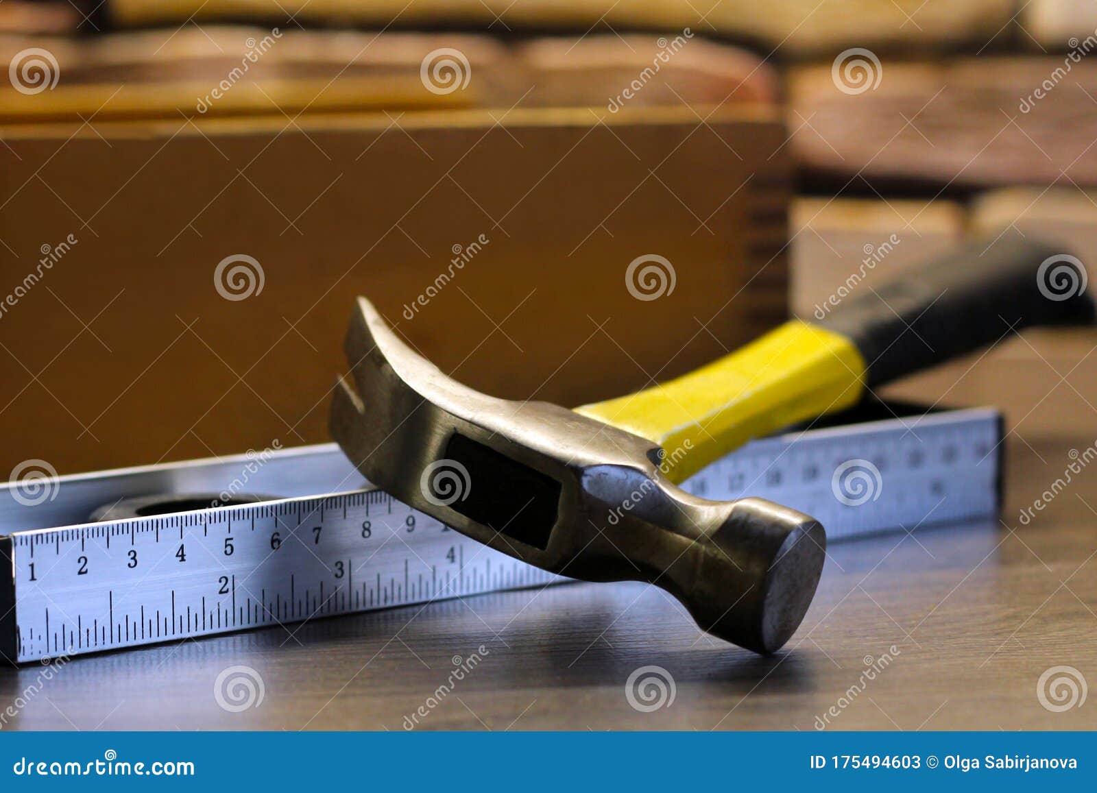 Yellow Hammer and Level for Repair and Construction Stock Image - Image ...