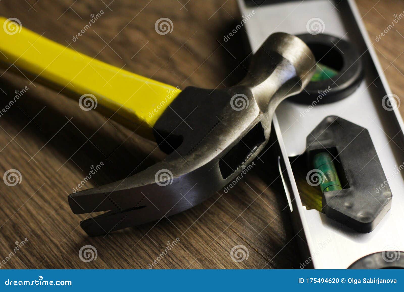 Yellow Hammer and Level for Repair and Construction Stock Photo - Image ...