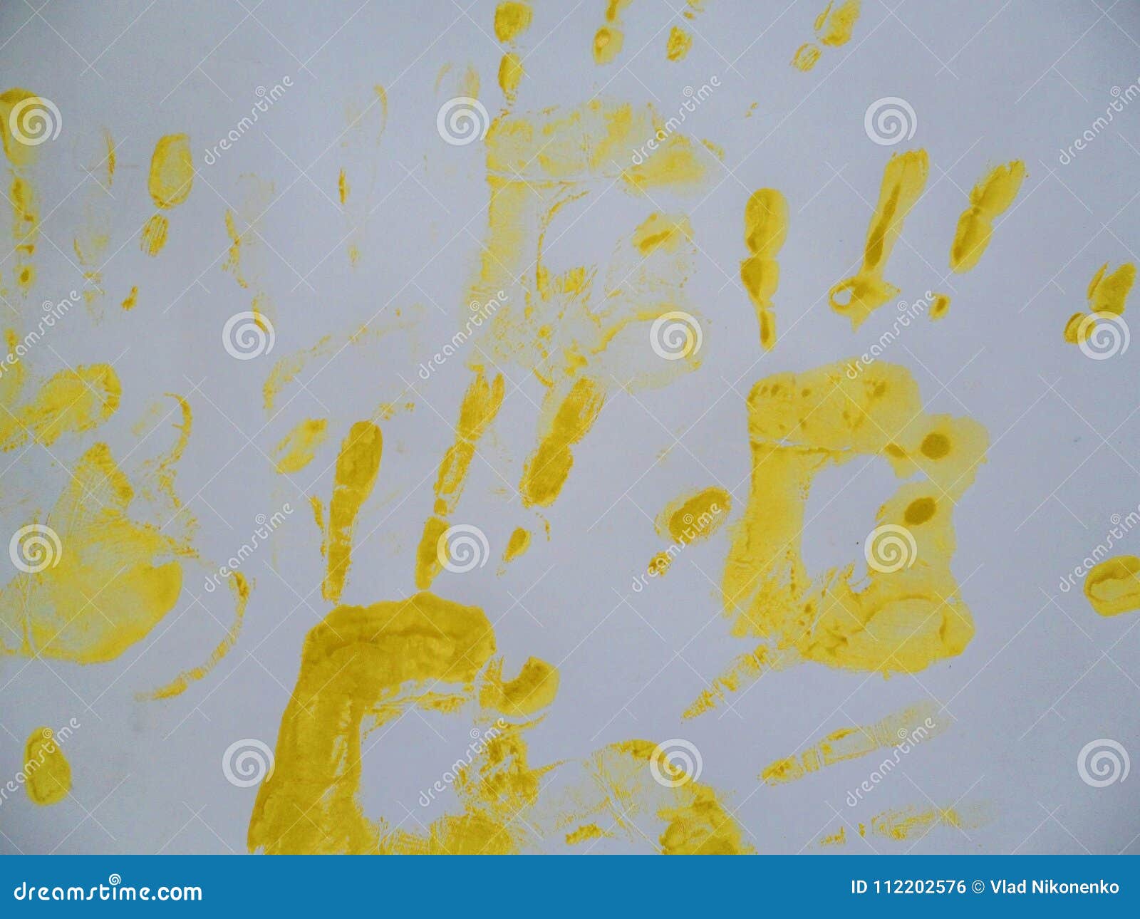 Yellow Hand Yellow Traces on White Paper Stock Photo - Image of yellow ...