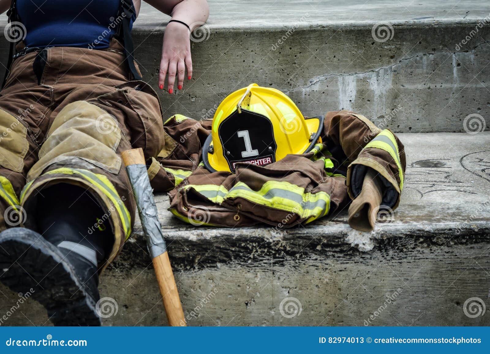 Yellow Hard Hat On Brown And Yellow Fireman's Suit Picture. Image: 82974013