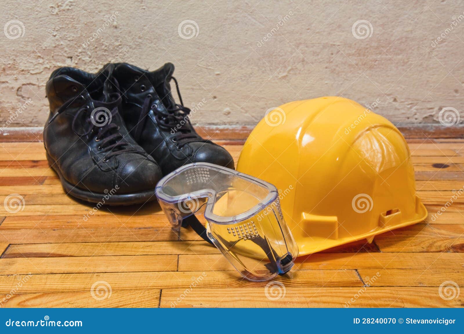Yellow Hard Hat, Old Leather Boots and Protective Goggles Stock Photo ...