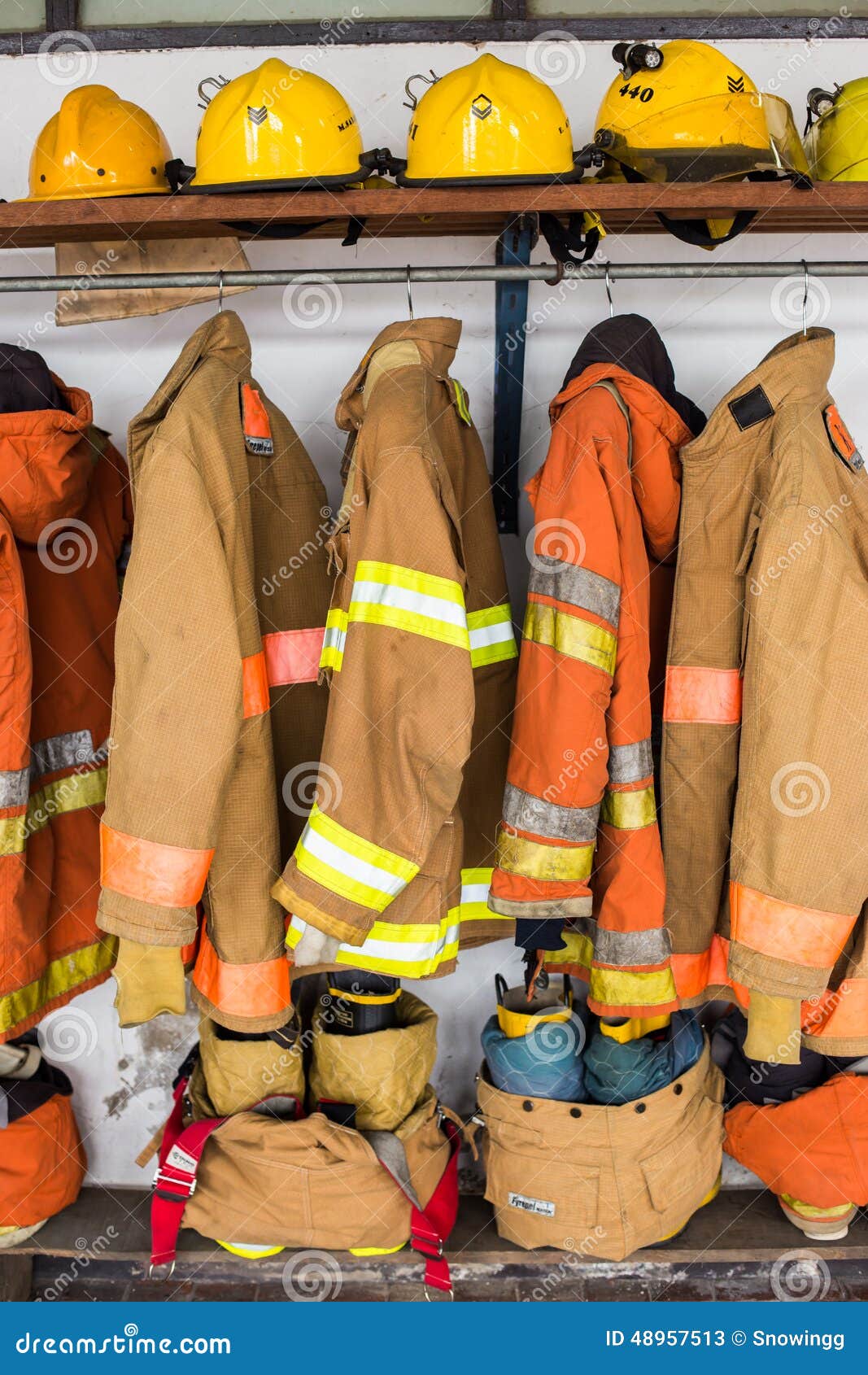 Yellow Helmet and Jacket of Fire Fighter Stock Image - Image of ...